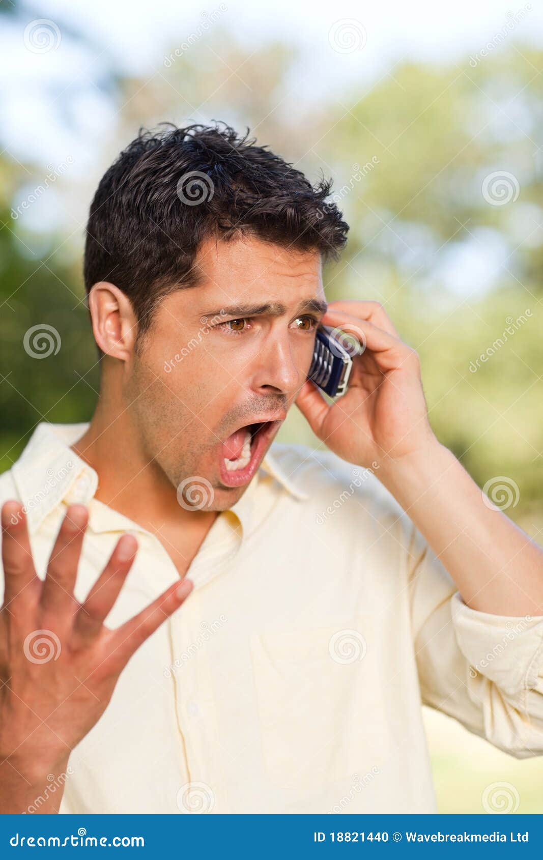 Man phoning in the park stock photo. Image of cellular - 18821440