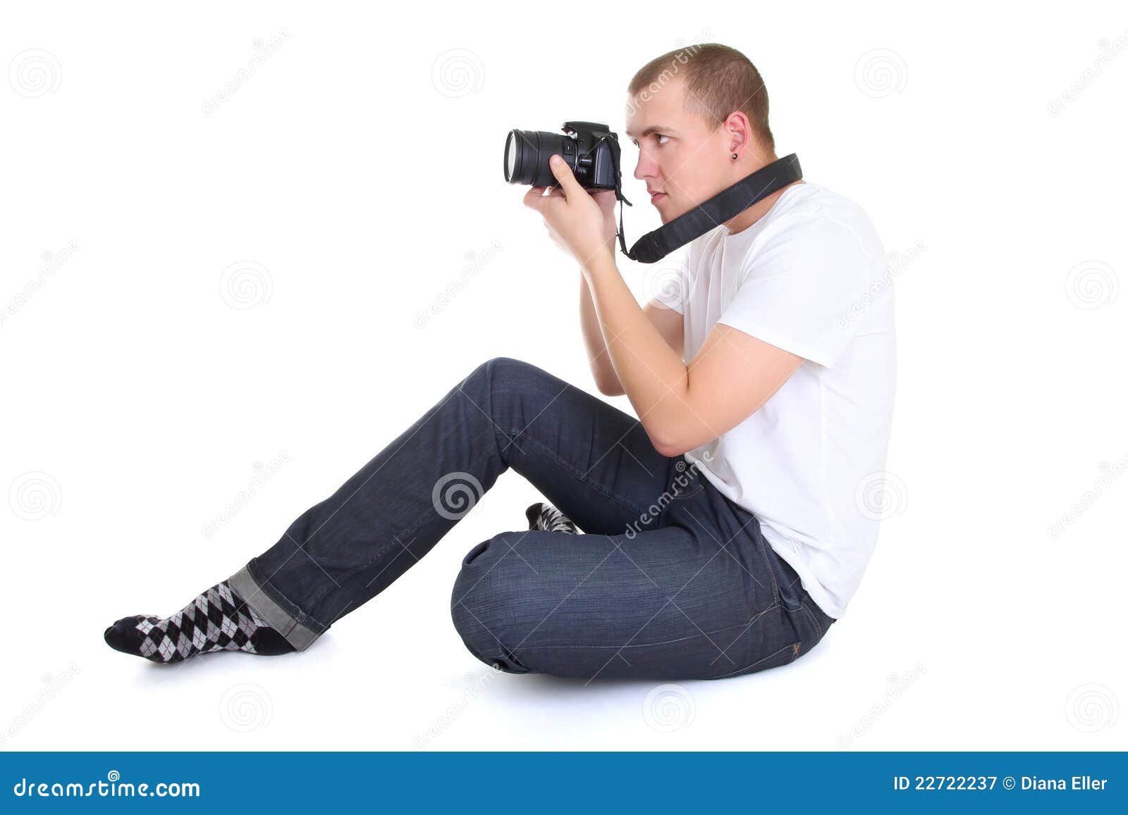 Man with Photo Camera Sitting Stock Image - Image of jeans, dslr: 22722237