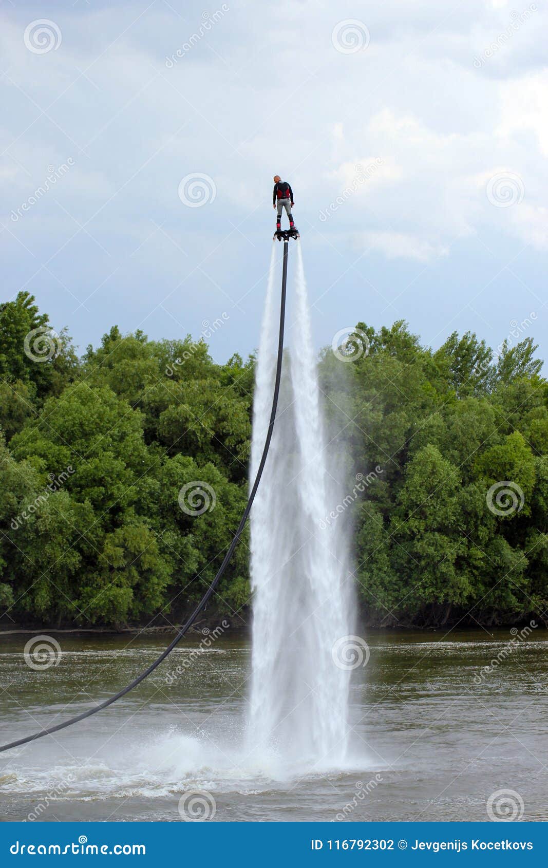 Athlete With A Jetpack Soars Over Black Sea. Two Powerful Jets Of Water ...