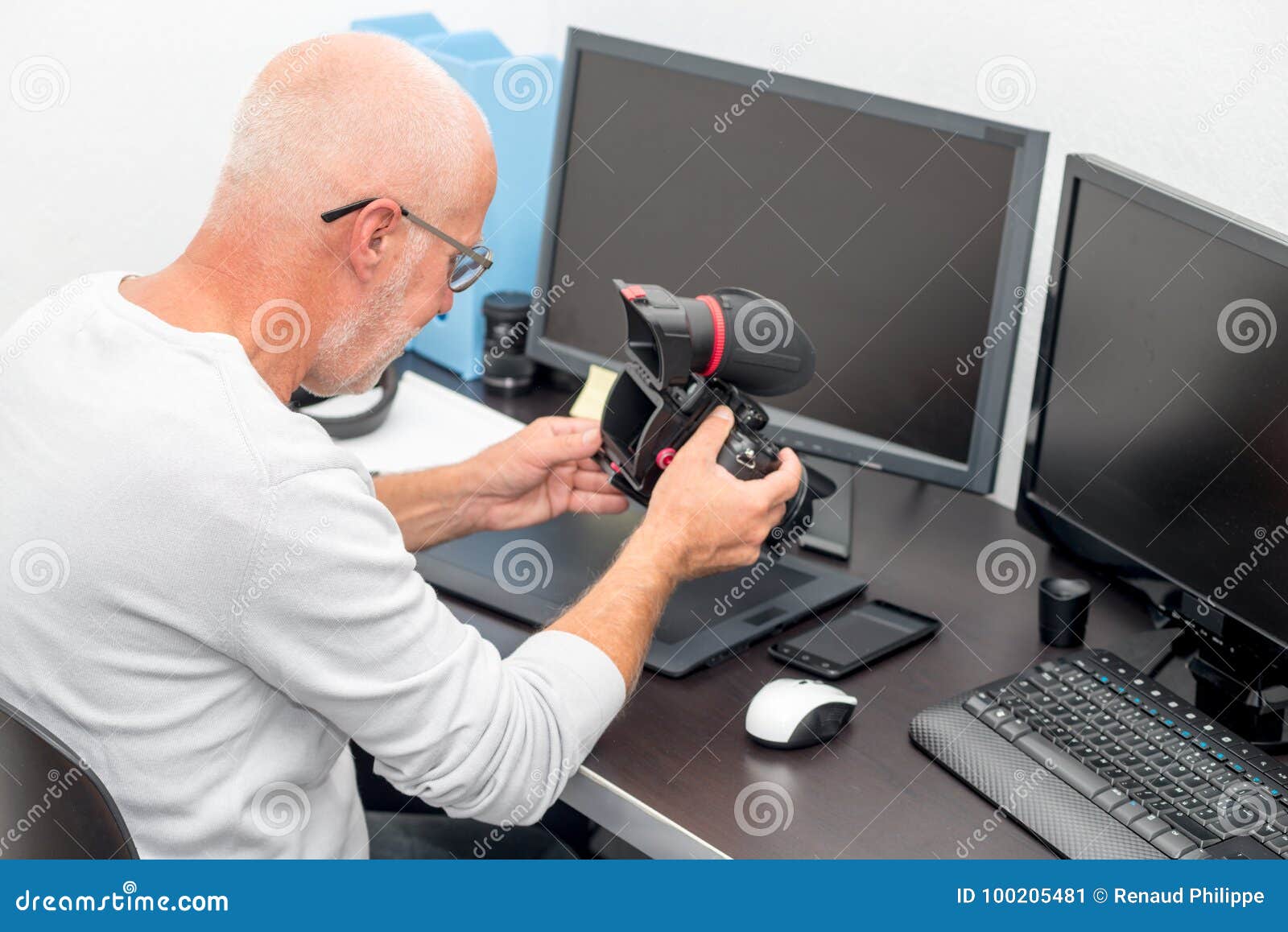 Photographer with Camera at Office with Computer Stock Image - Image of ...
