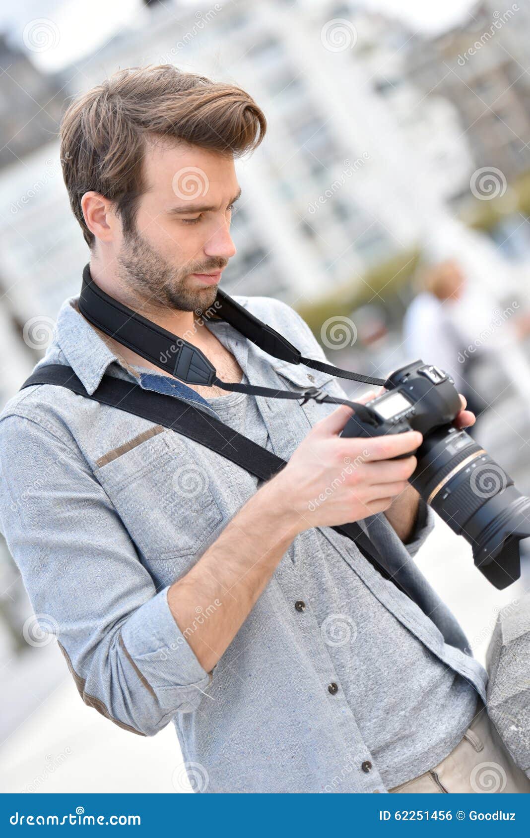 Man Photographer Checking Photos on a Reflex Stock Photo - Image of ...