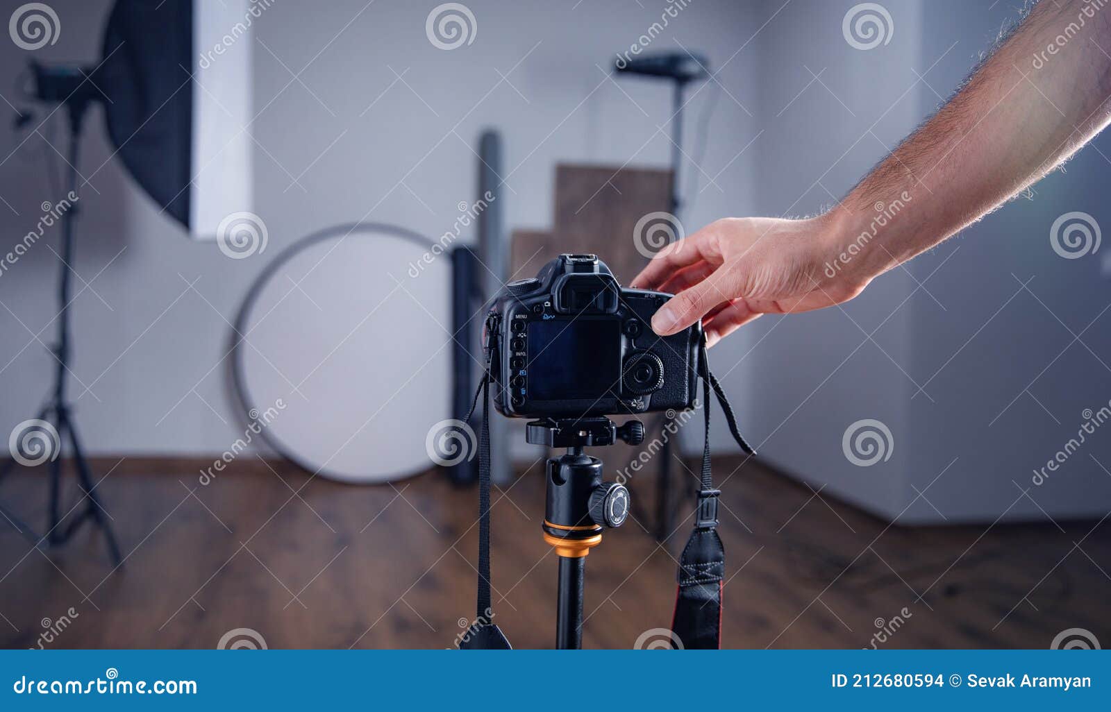 Man Photographer Hand Camera in Studio Background. Stock Photo - Image ...