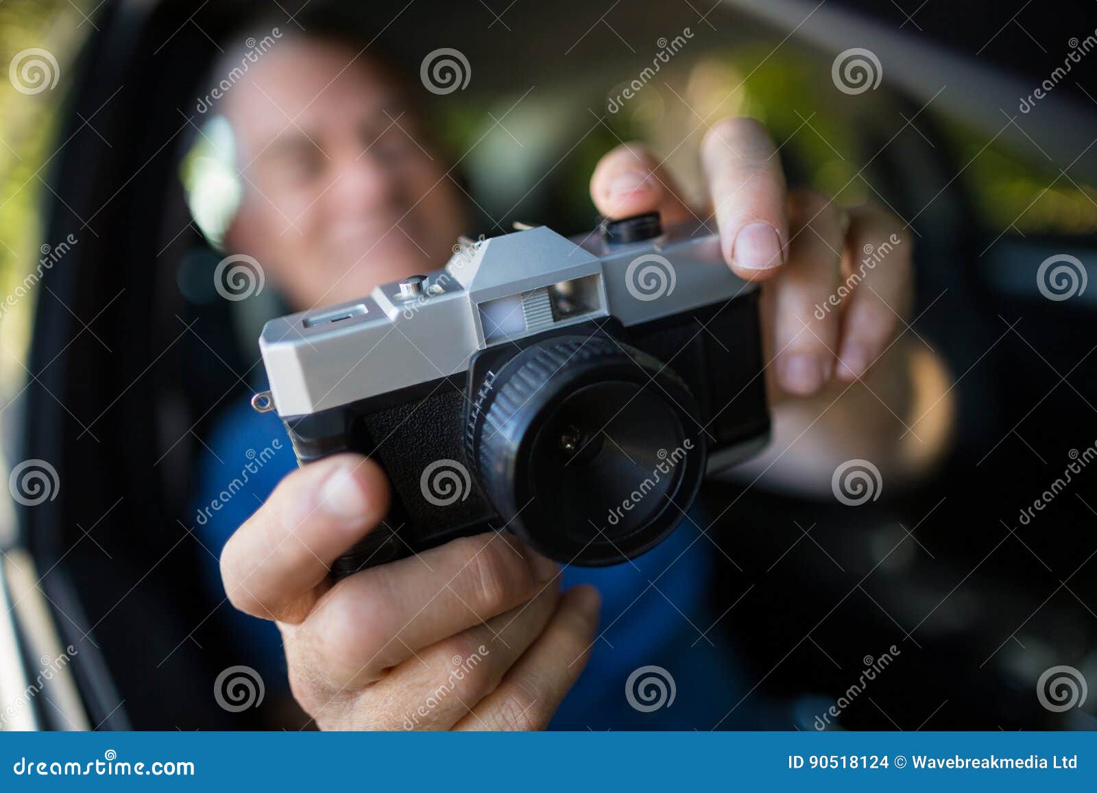 Man Photographing with Camera in Car Stock Photo - Image of four ...