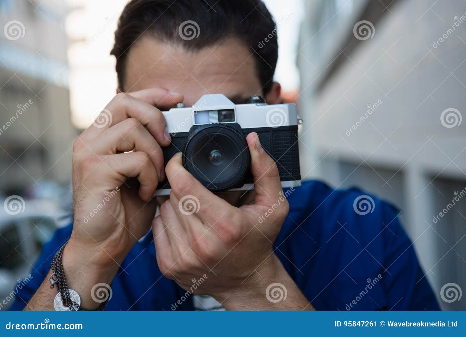 Man Photographing with Camera Stock Image - Image of blue, adult: 95847261