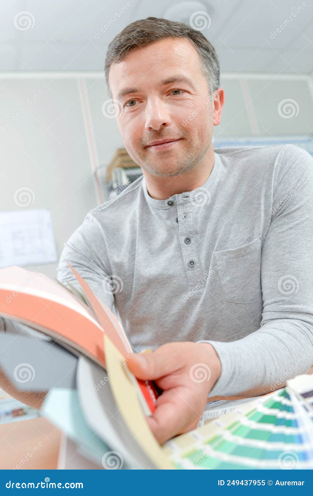 Man picking colour scheme stock image. Image of coloring - 249437955