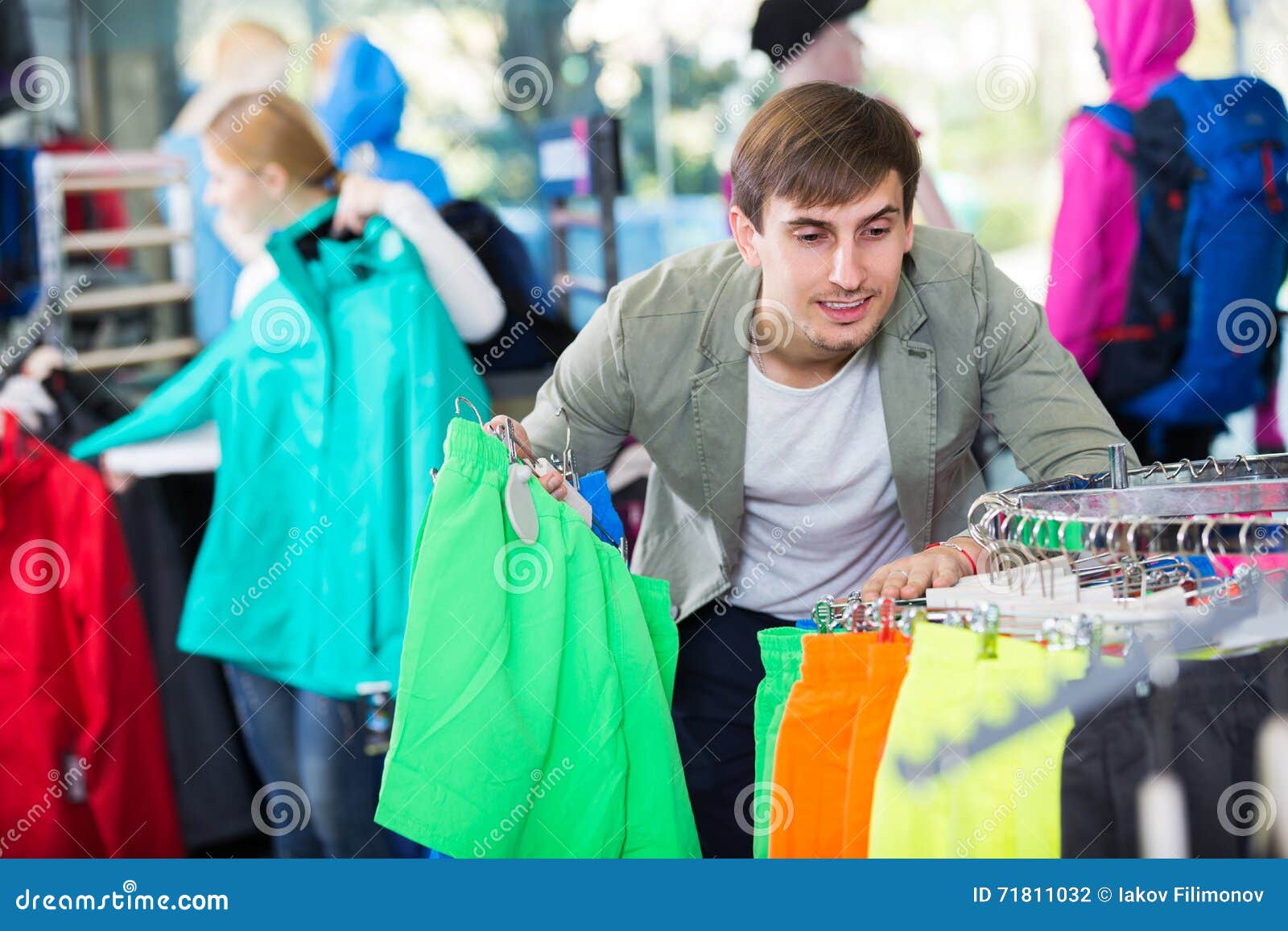 Man Picking a Sport Clothes Stock Photo - Image of enjoy, choosing ...