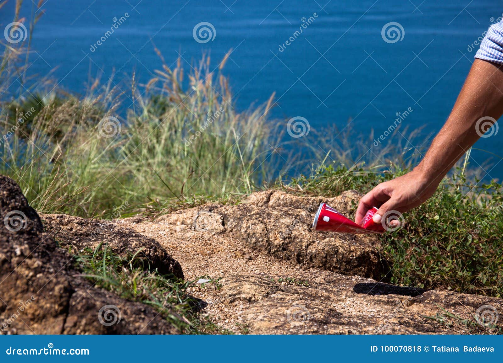 Man picking up litters stock photo. Image of nature - 100070818