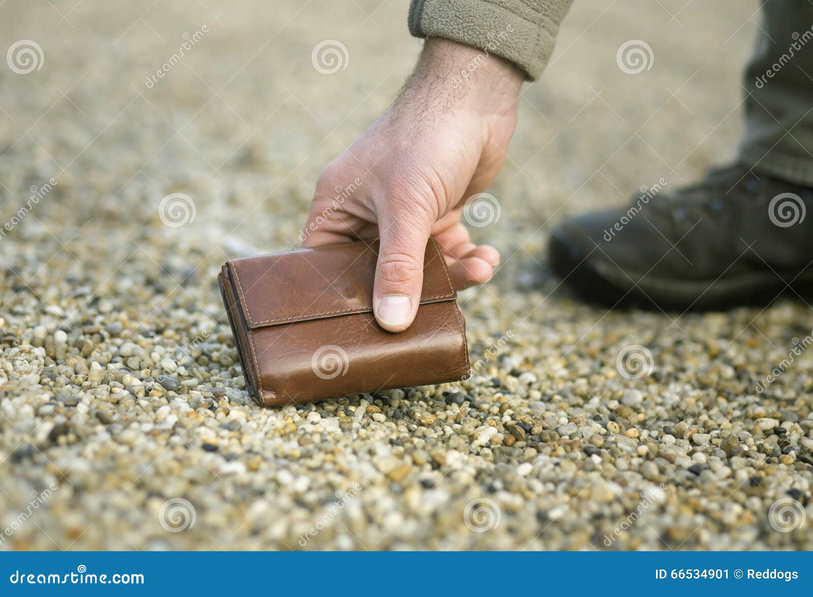 Man picking up wallet stock image. Image of concept, dropped - 66534901