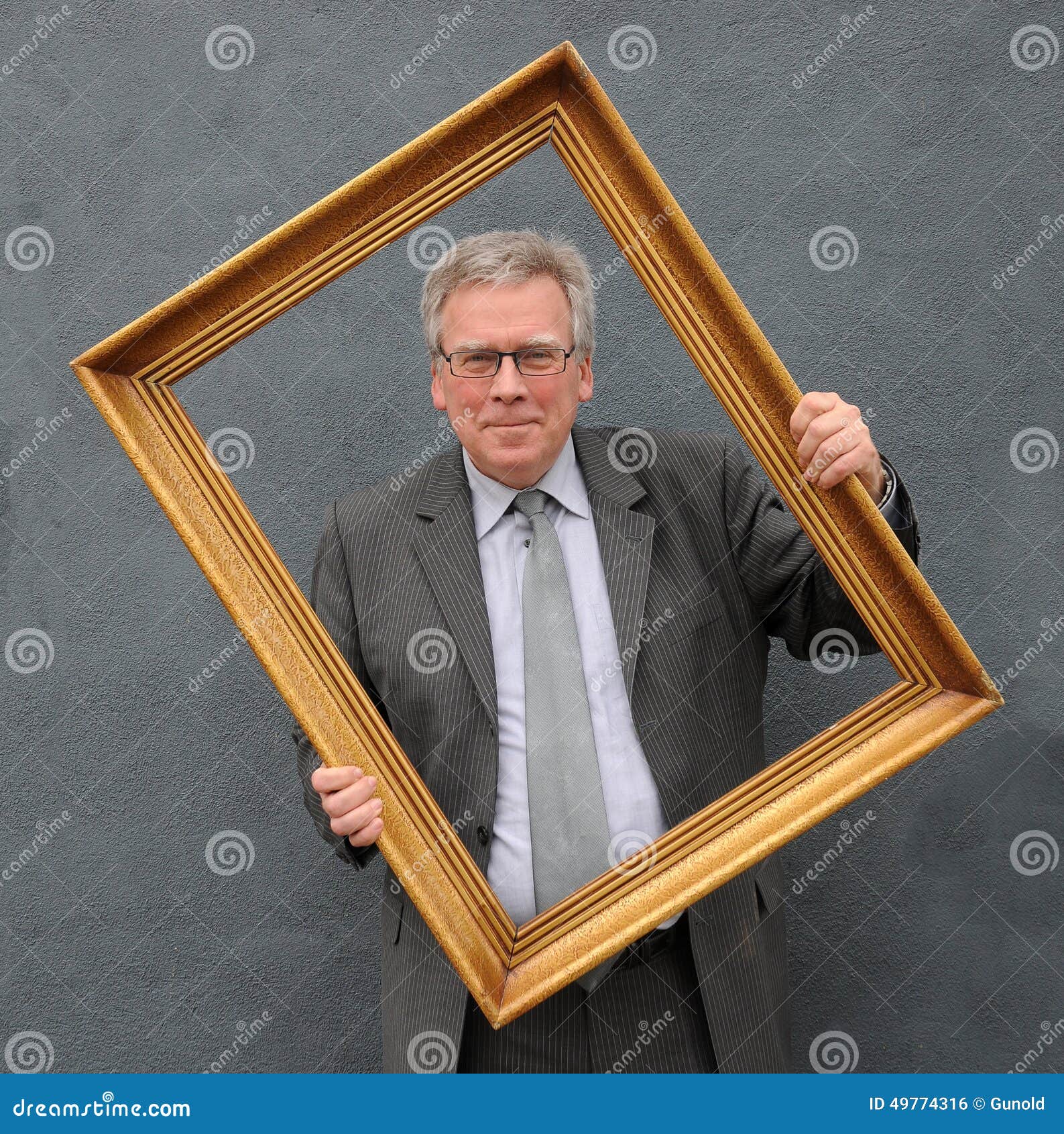 Man With Picture Frame Stock Photo - Image: 49774316