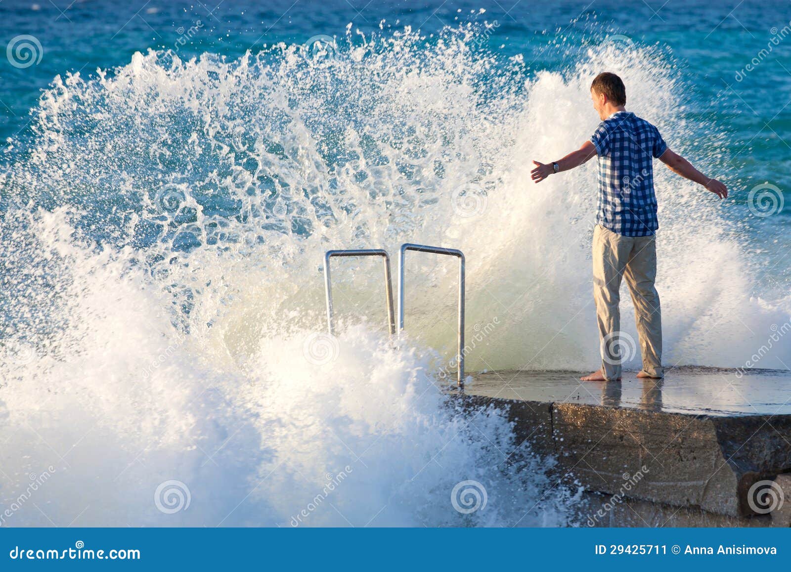 Man on the Pier Against the Big Wave Stock Image - Image of harbor ...