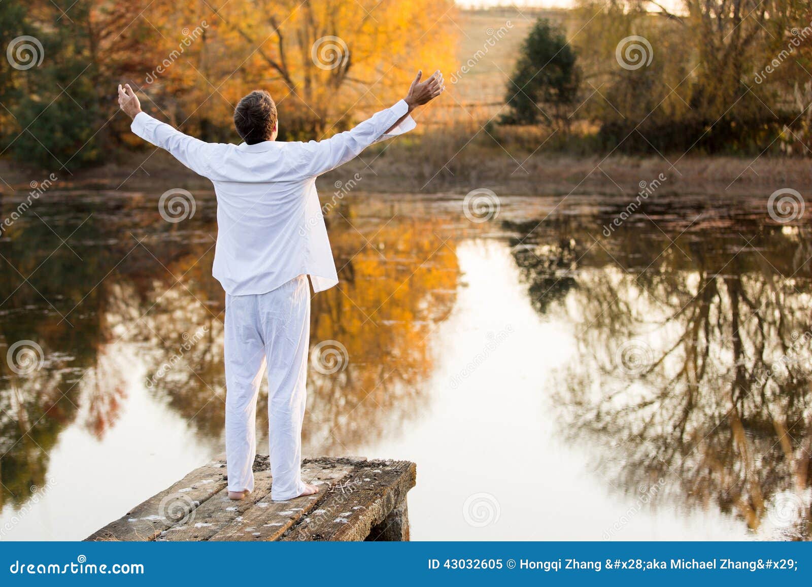 Man pier arms outstretched stock image. Image of full - 43032605