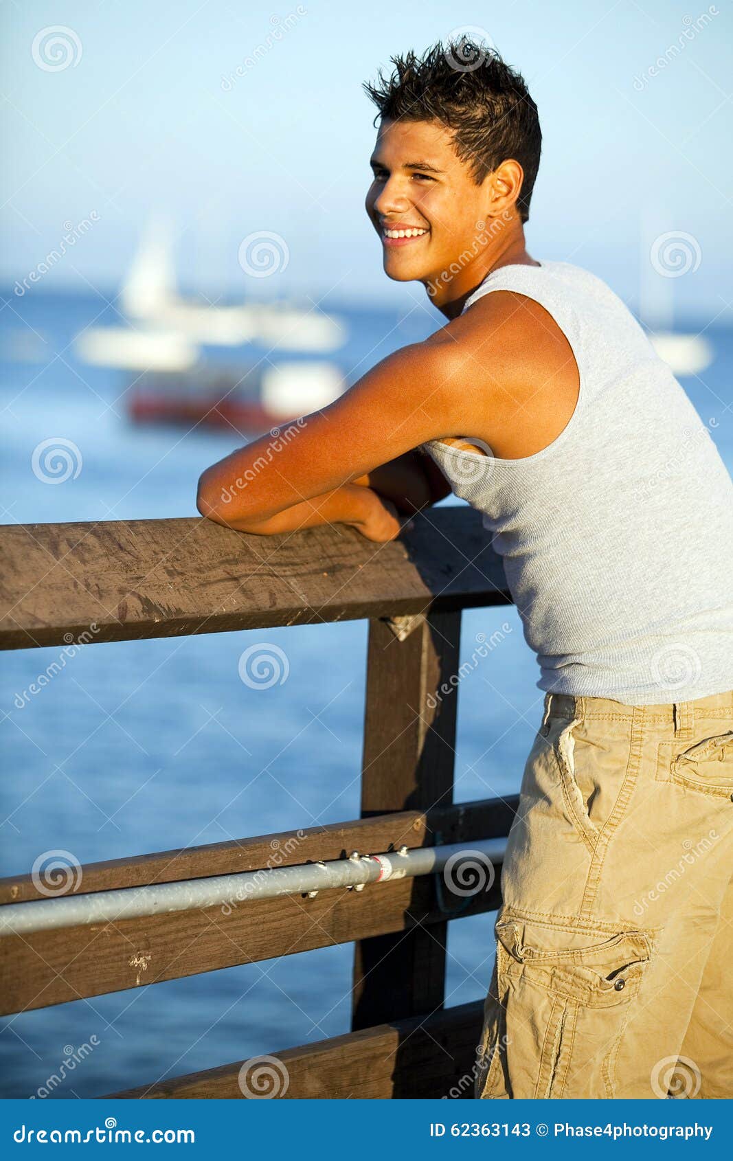 Man on pier stock image. Image of brunette, portrait - 62363143