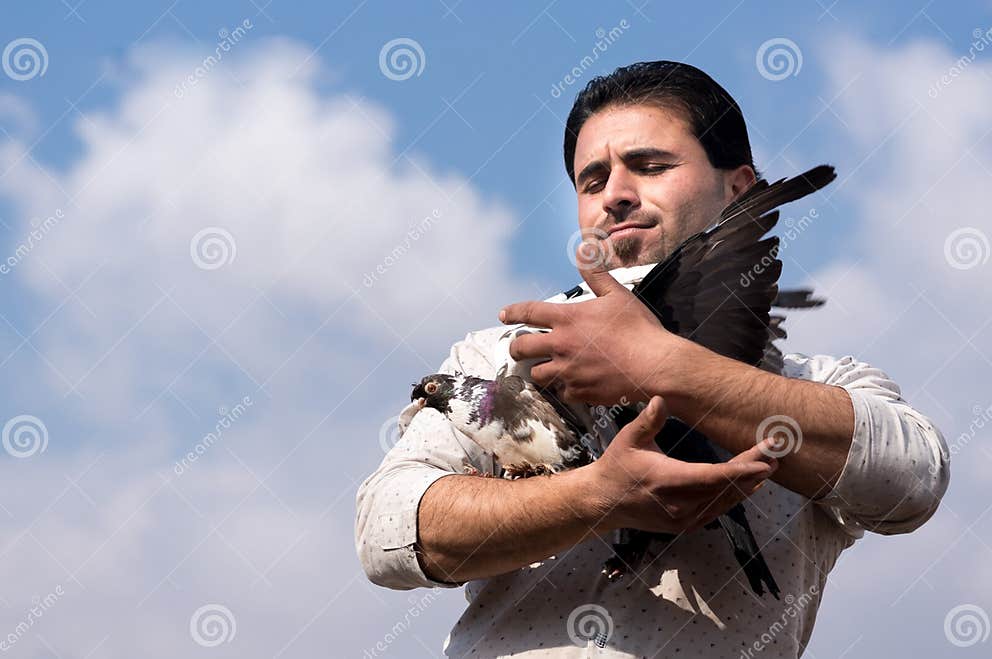 Man with Pigeons stock photo. Image of hairy, tamed, pigeons - 89115946