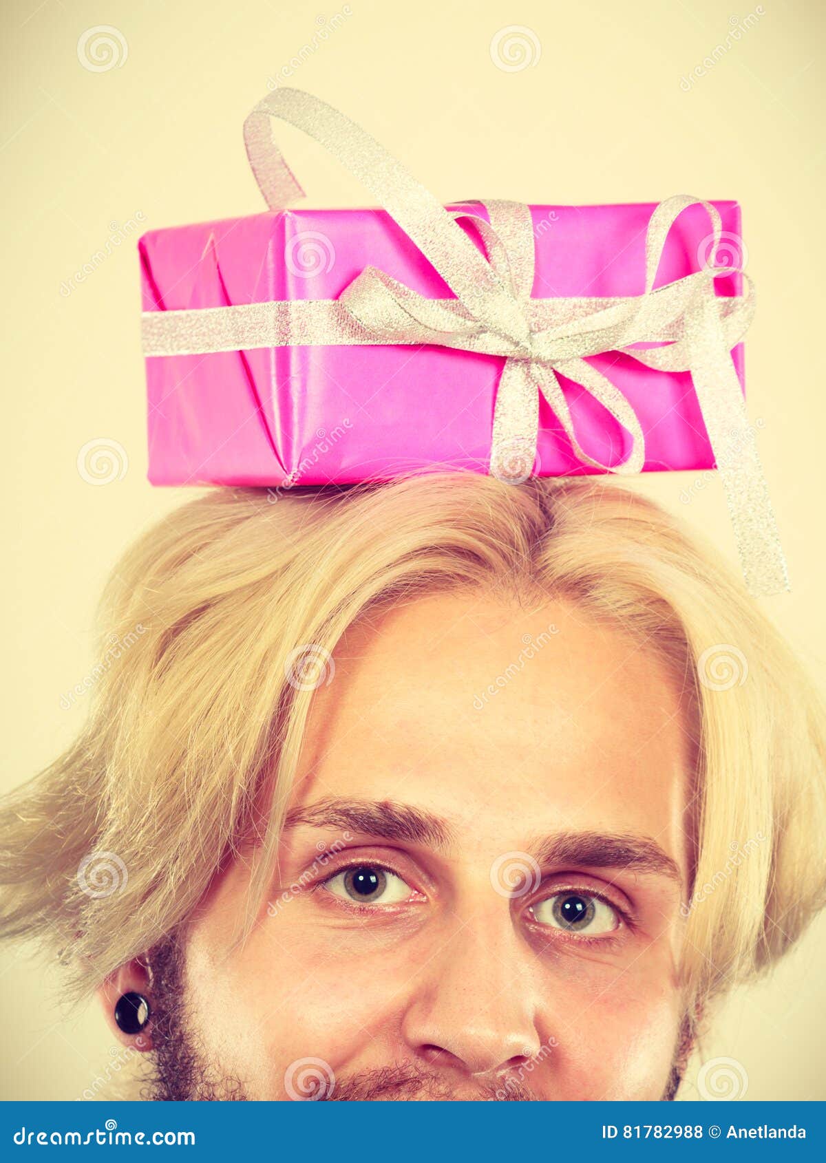 Man with Pink Gift Box on His Head Stock Photo - Image of surprise ...