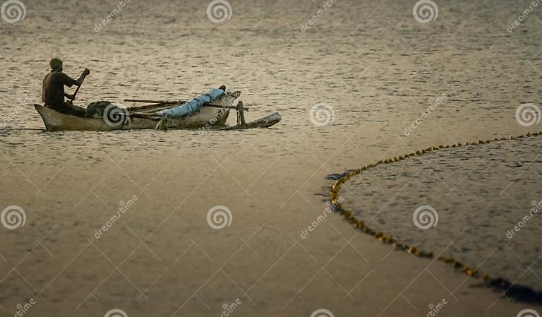 Man in a pirogue editorial image. Image of fisherman - 44236010