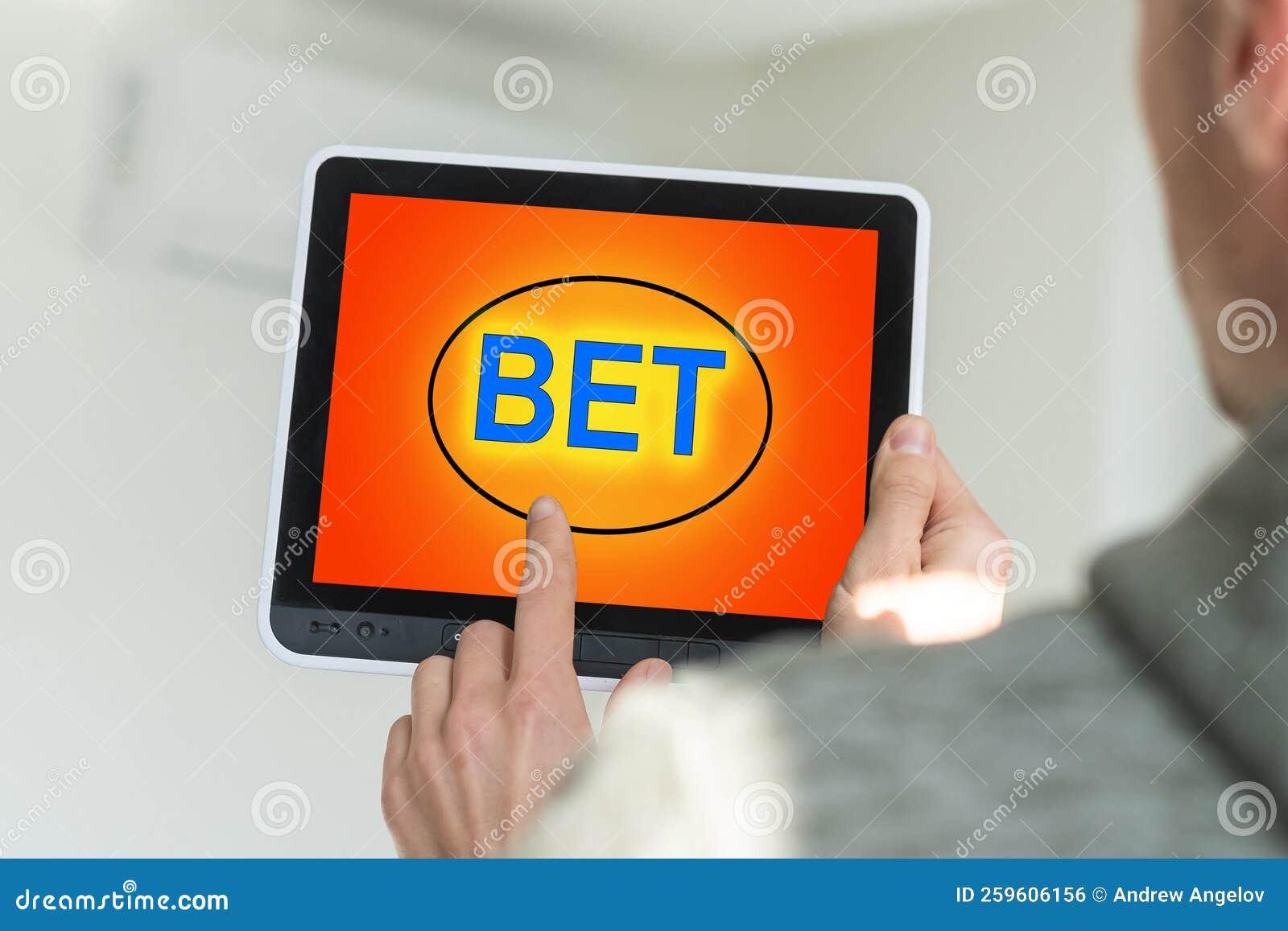 Man Placing Bet with Tablet Computer, Closeup Stock Photo - Image of ...