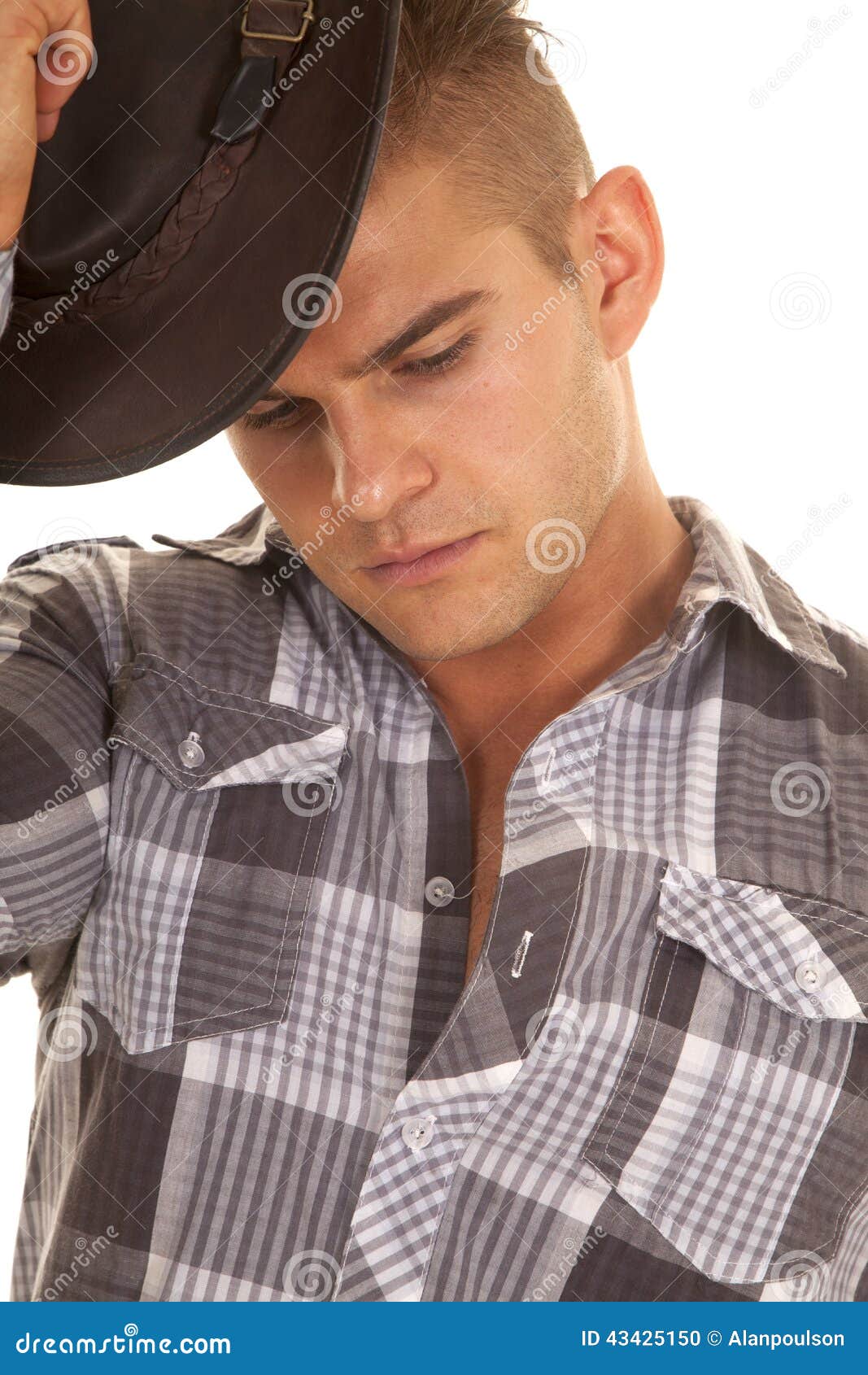 Man Plaid Shirt Putting on Hat Close Stock Photo - Image of poised ...