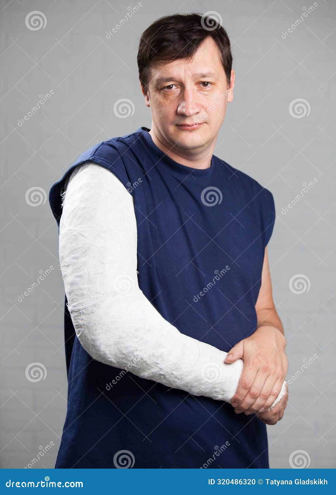 Man with a plaster stock photo. Image of shoulder, equipment - 320486320