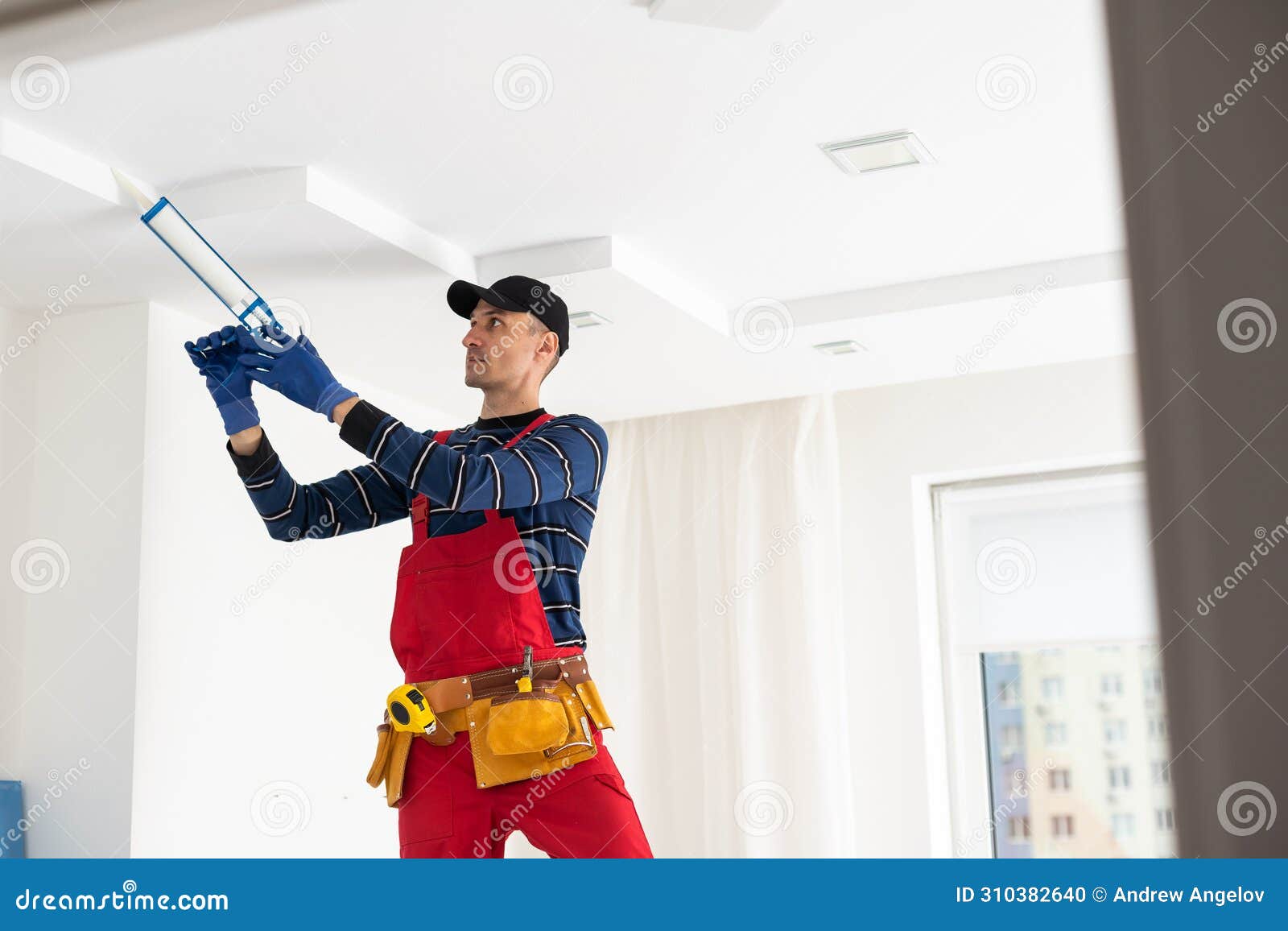 Man Plasterer Construction Worker at Work, Takes Plaster from Bucket ...