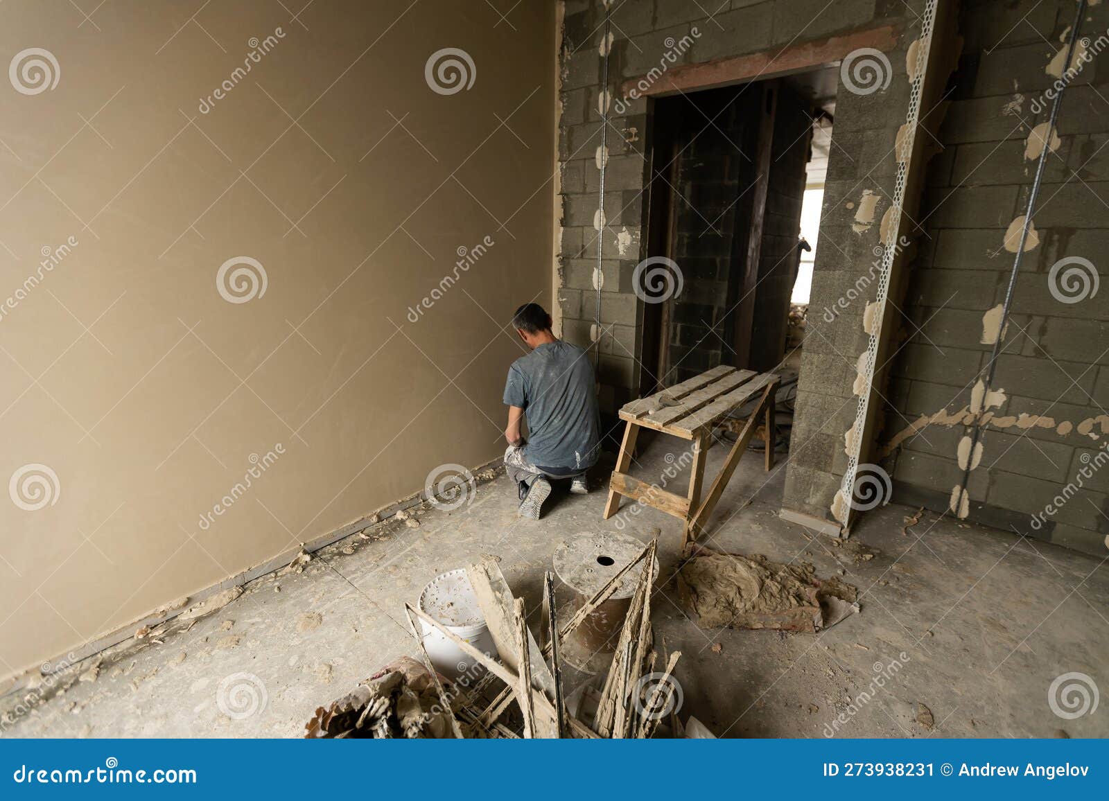 Man Plasterer Construction Worker at Work with Trowel, Plastering a ...