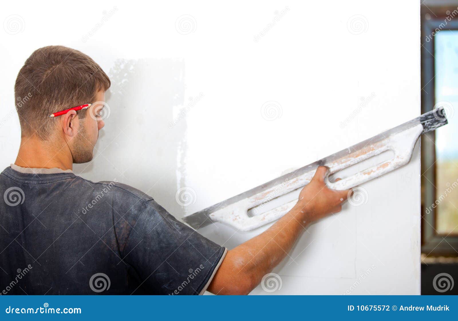 Man plastering the wal stock photo. Image of board, household - 10675572