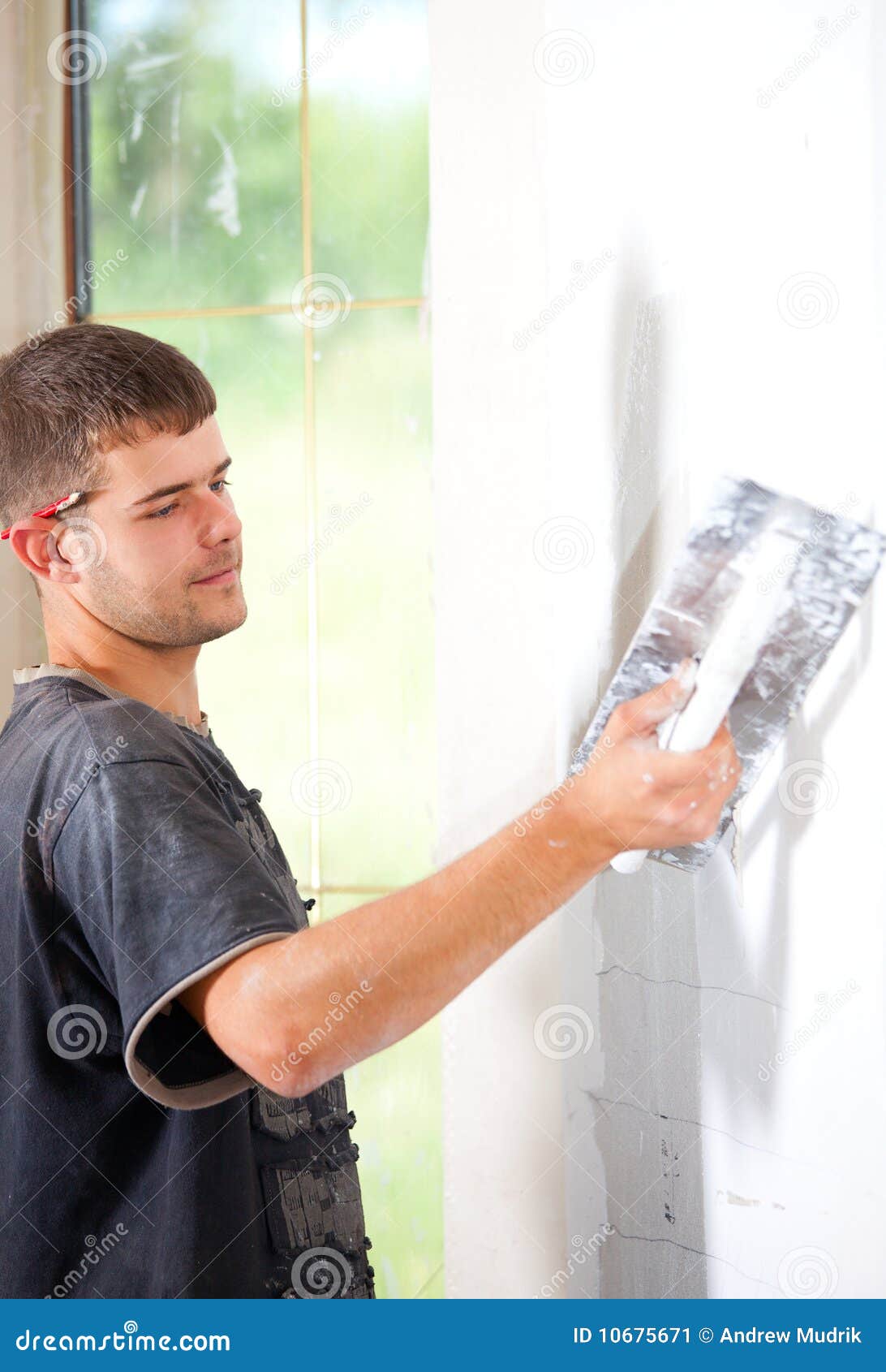 Man plastering the wall stock image. Image of estate - 10675671