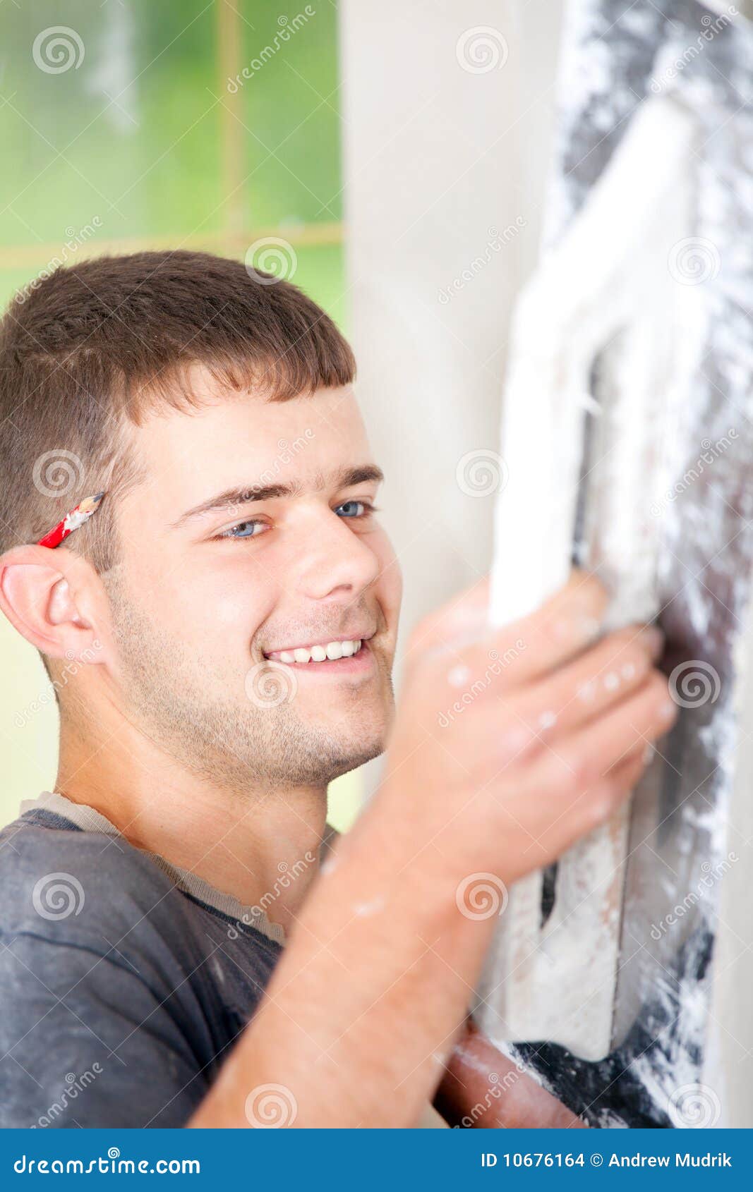 Man plastering the wall stock photo. Image of interior - 10676164