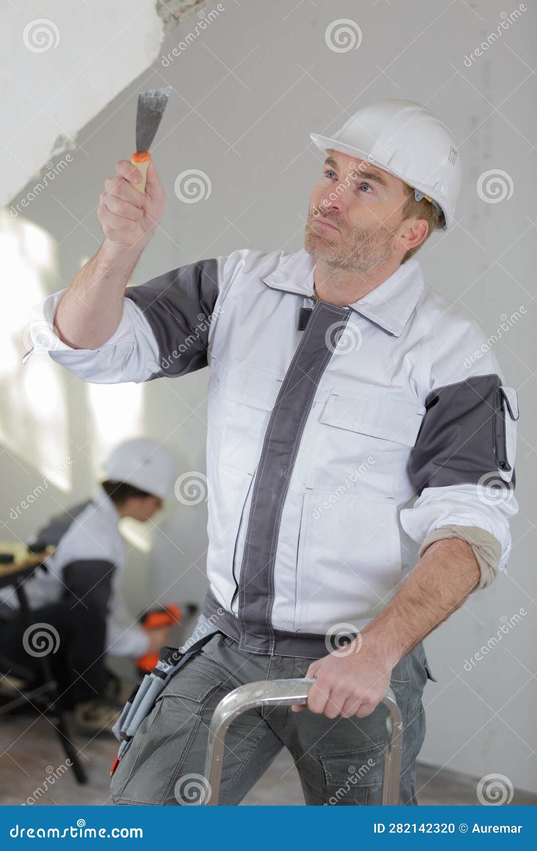 Man Plastering Wall with Professional Work Tool Stock Photo - Image of ...