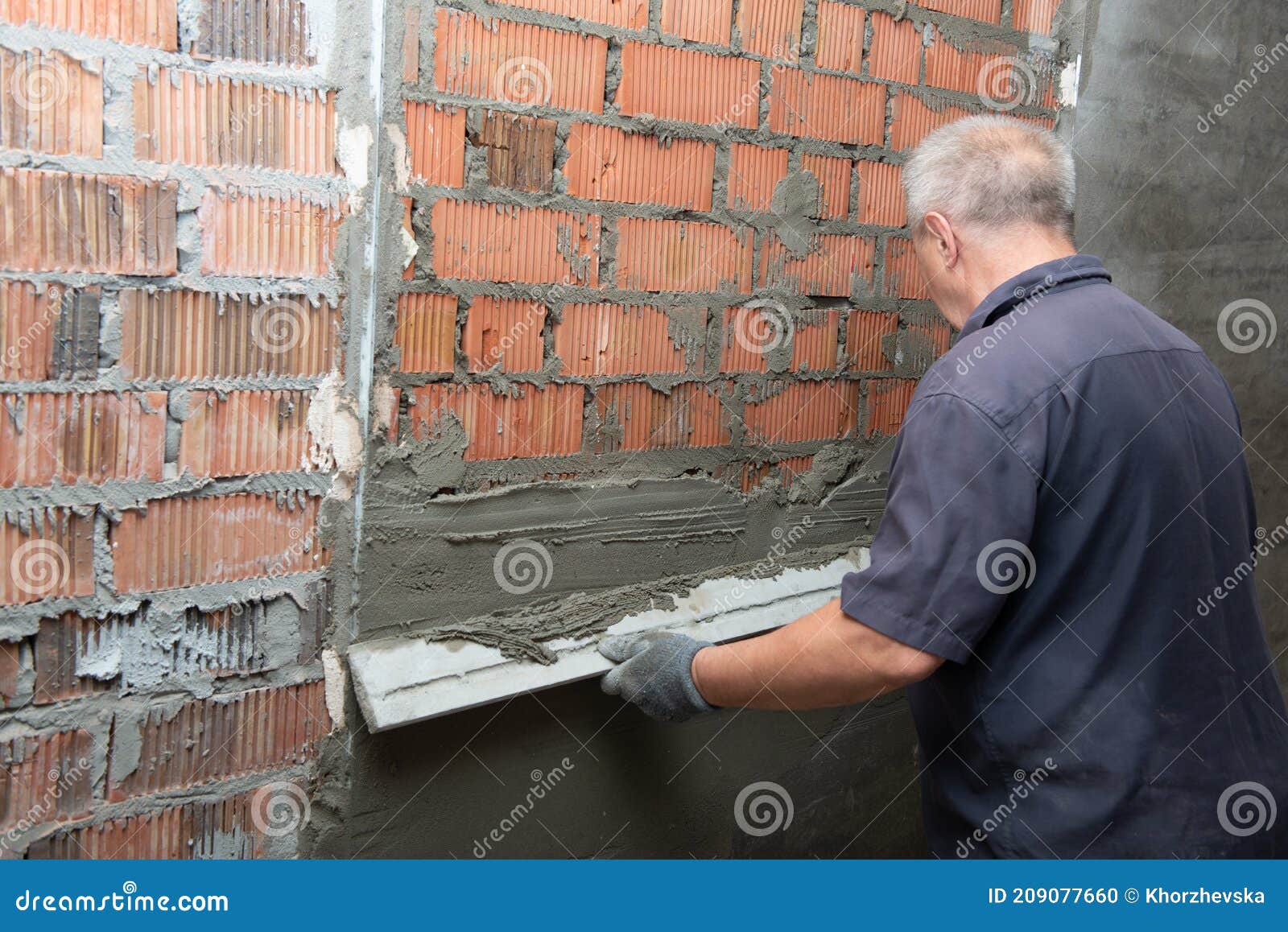 Man Plastering Wall. Worker Makes Renovation Stock Photo - Image of ...