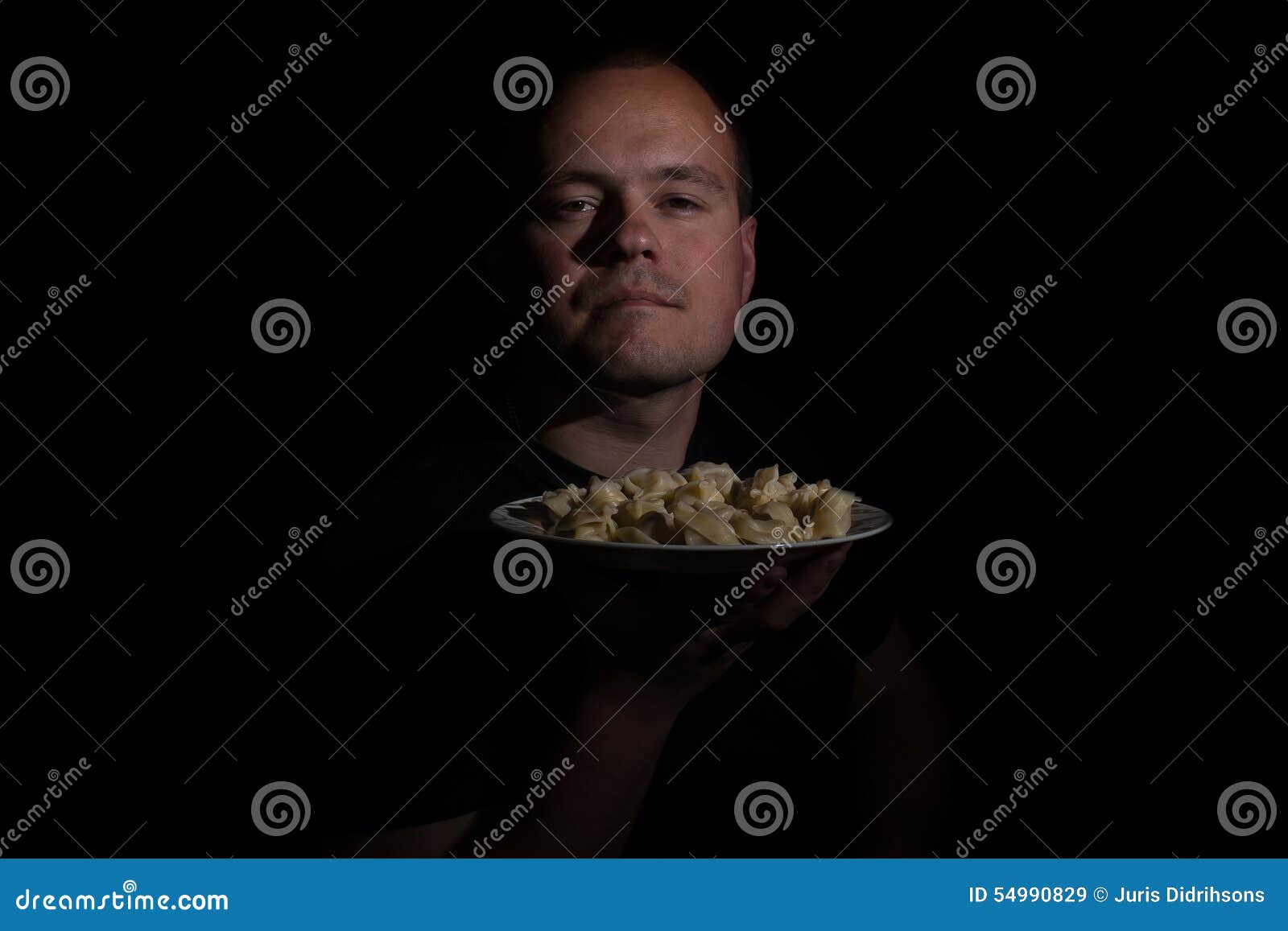 Man with Plate of Dumplings Stock Image - Image of adult, body: 54990829
