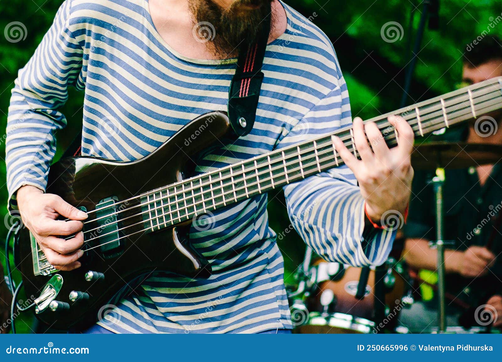 Man play on bass guitar stock photo. Image of closeup - 250665996