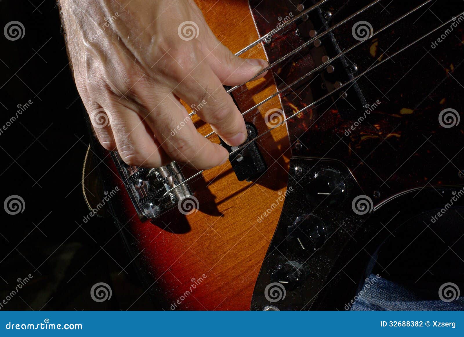 Man playing an bass guitar stock photo. Image of entertain - 32688382