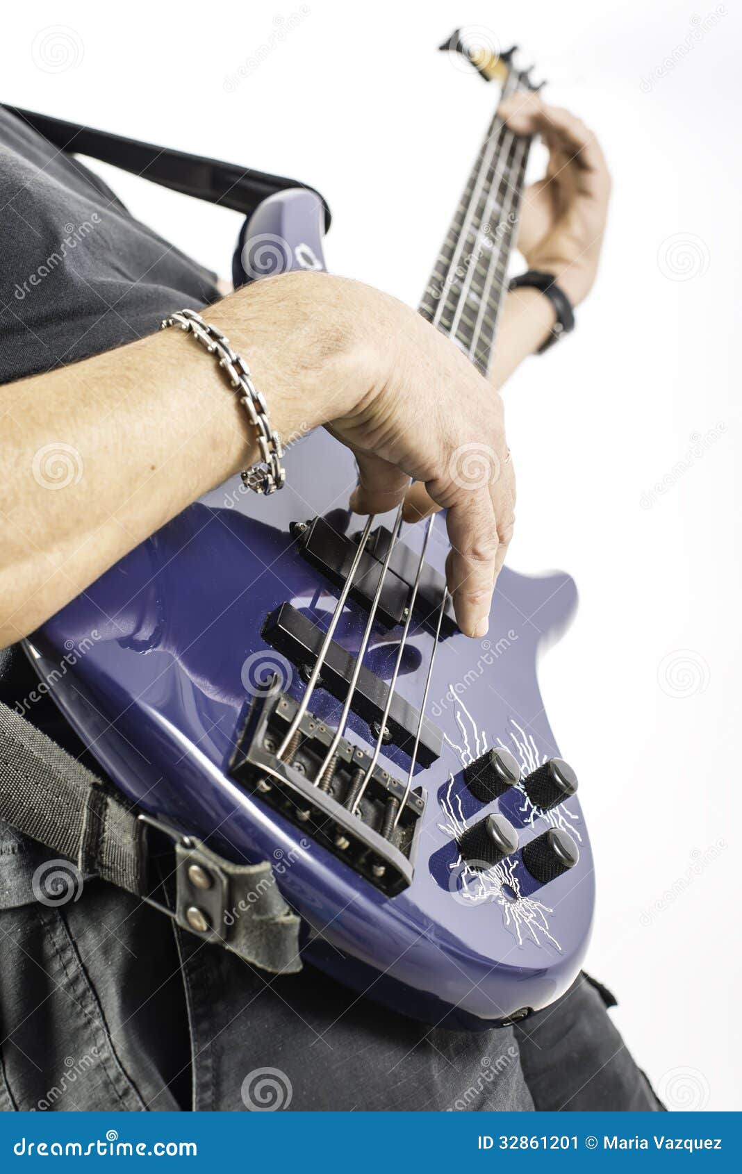 Man playing a bass guitar stock image. Image of guitarist - 32861201