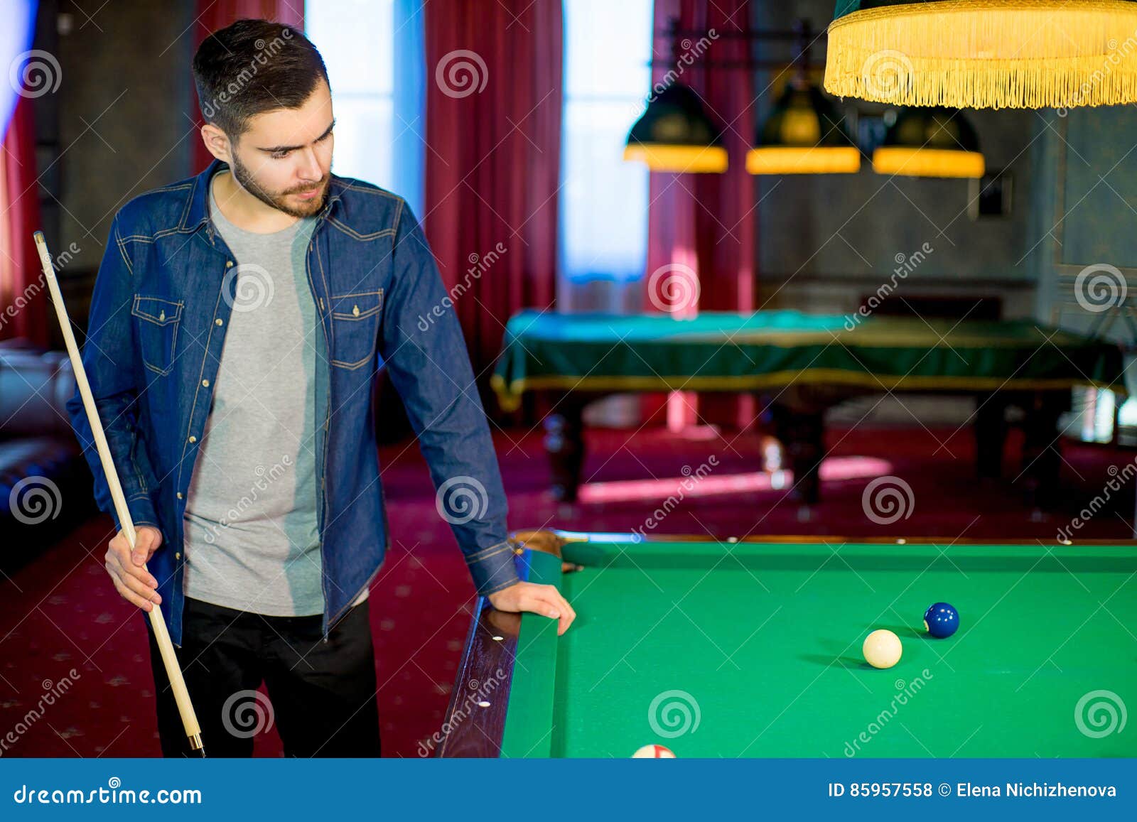 Man playing billiard stock photo. Image of lifestyle - 85957558