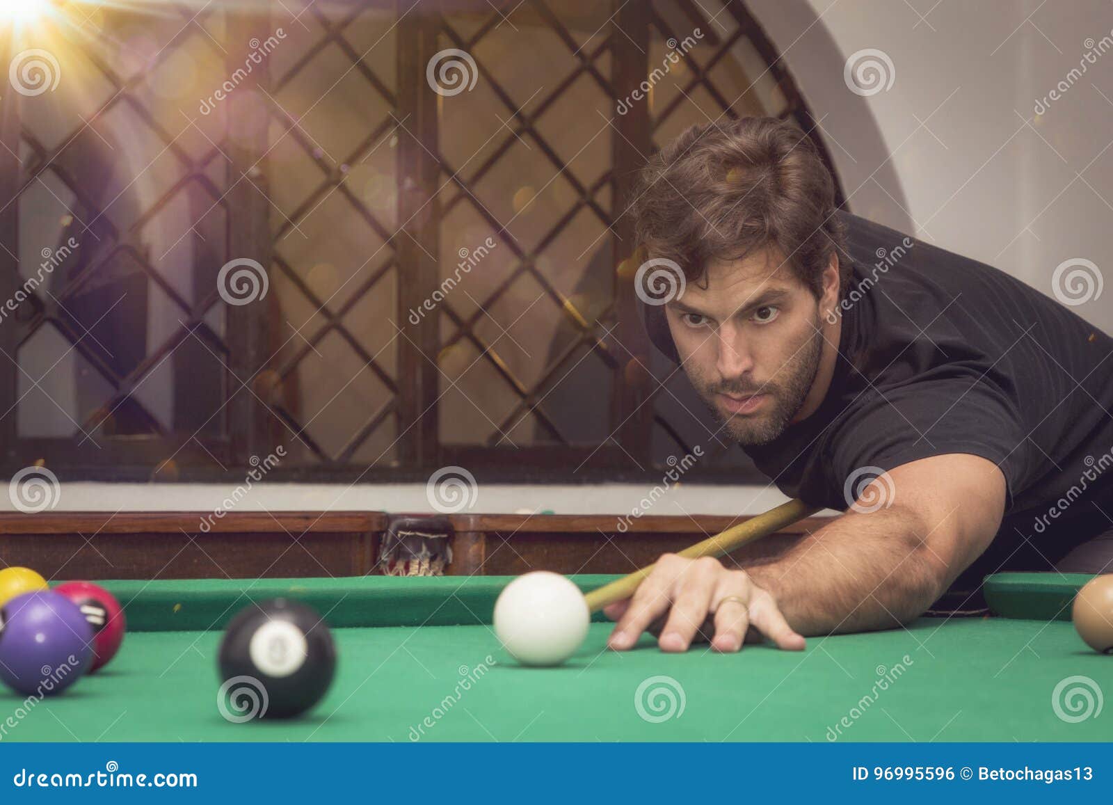Man Playing Billiards in a Pool Table. Stock Photo - Image of green ...