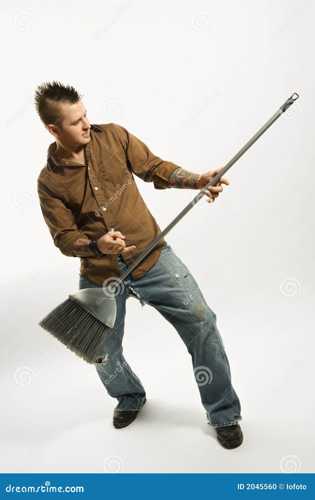Man Playing Broom Like Guitar Stock Photo - Image of rock, music: 2045560