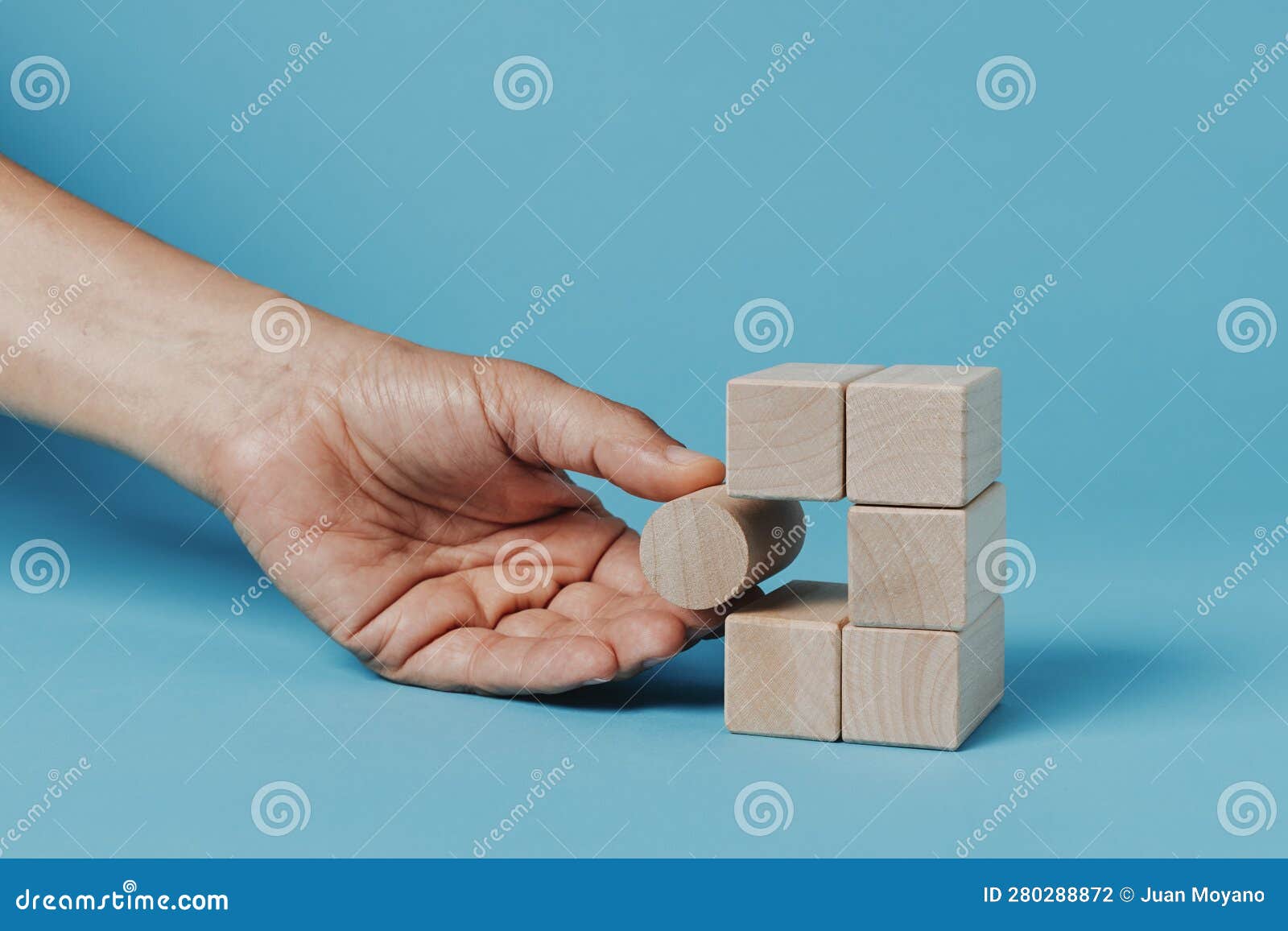 Man is Playing with Building Blocks Stock Photo - Image of cylinder ...