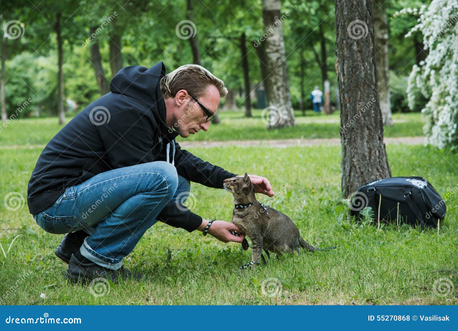 Man Playing the Cat Outdoor Stock Photo - Image of master, caress: 55270868