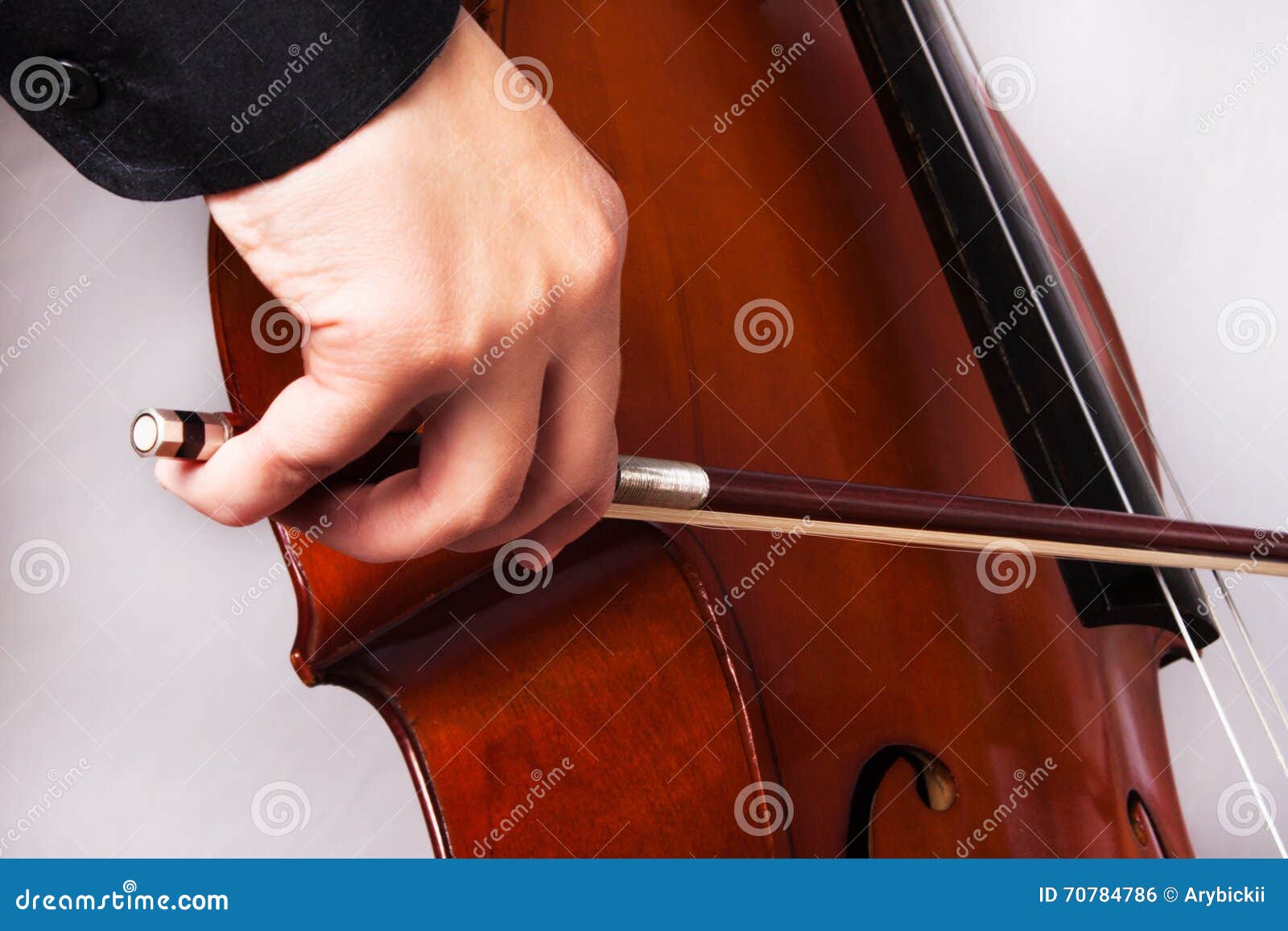 Man playing the cello. stock photo. Image of portrait - 70784786
