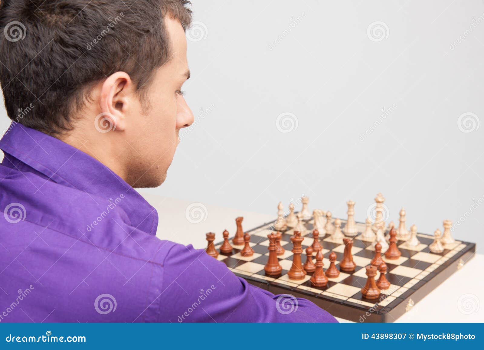 Man Playing Chess on White Background. Stock Image - Image of genius ...
