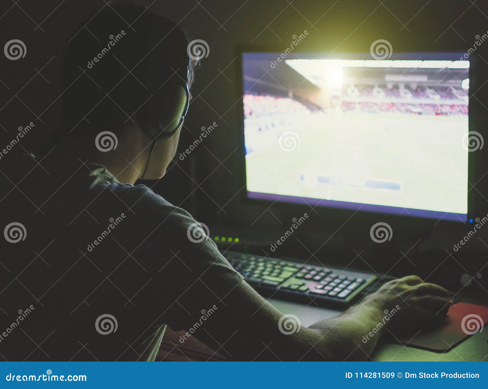 Man playing computer game. stock image. Image of headphones - 114281509
