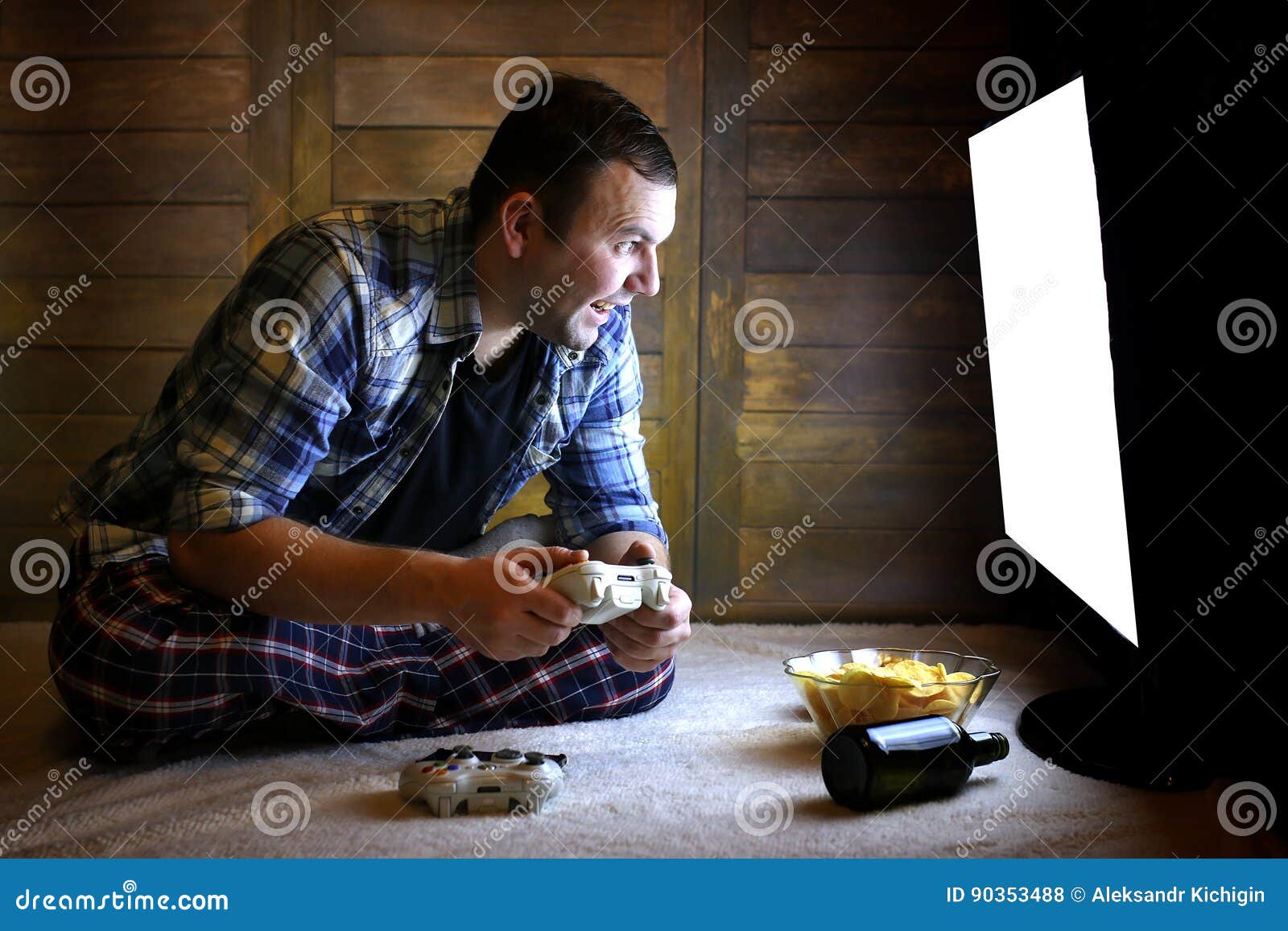 Man Playing on a Console on the Joystick before the Big TV Stock Photo ...