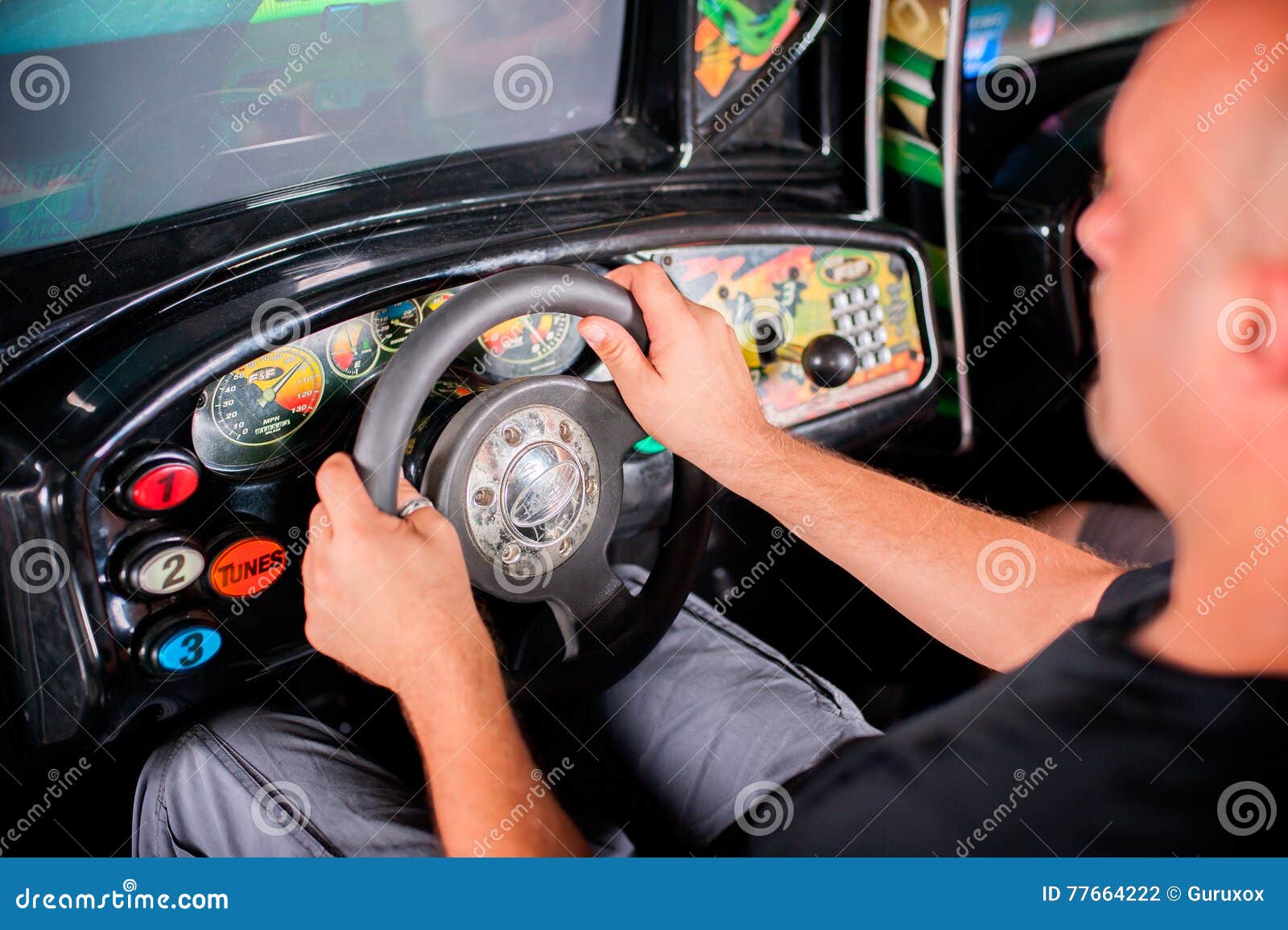 Man Playing Driving Wheel Video Game Stock Photo - Image of device ...
