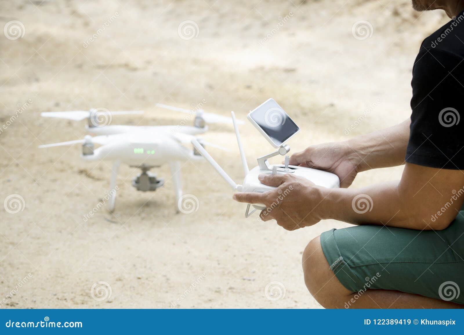 Man Playing Drone Holding Remote Control in Hand Stock Image - Image of ...