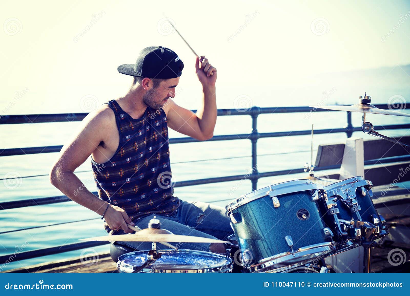 Man Playing Drum Near Bay At Day Time Picture. Image: 110047110