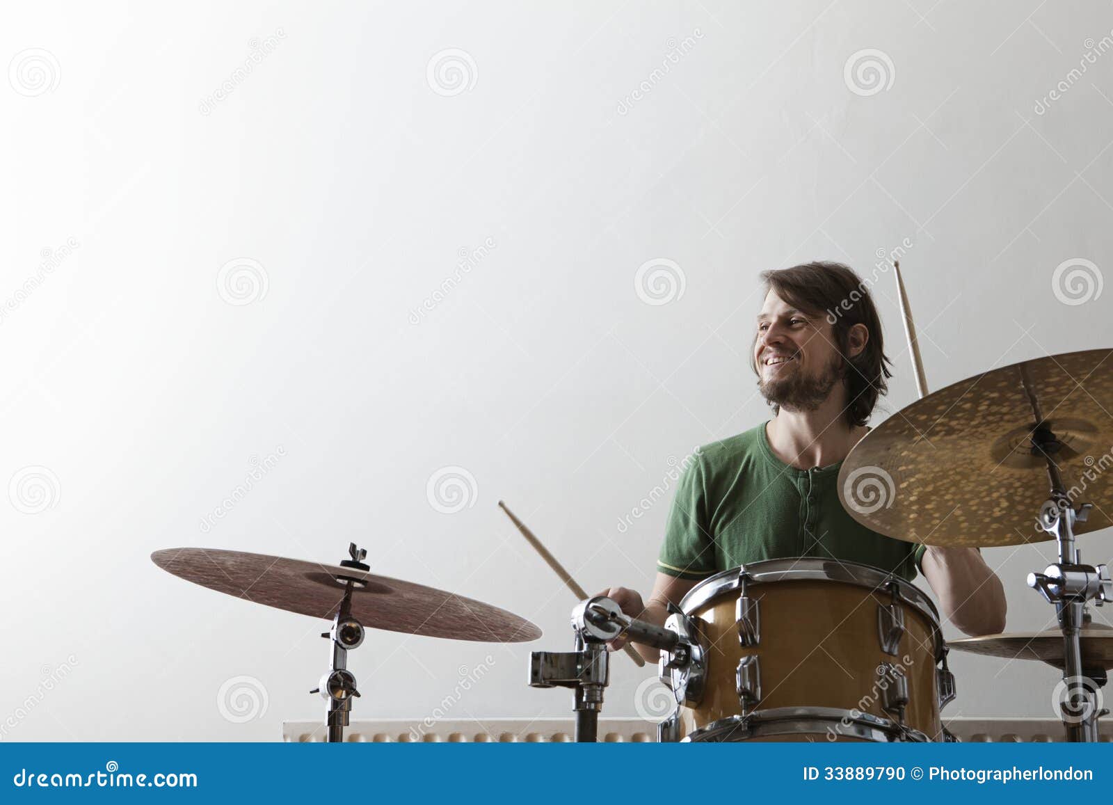 Man Playing Drum Set stock photo. Image of percussive - 33889790