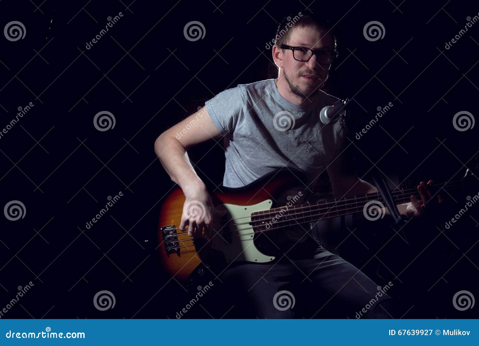 Man Playing on Electrical Bass Guitar Stock Image - Image of concert ...