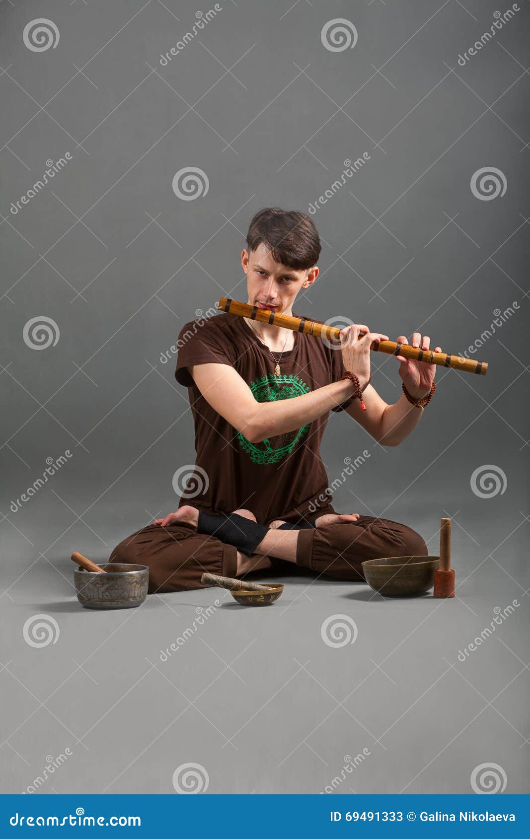Man Playing the Flute, Singing Bowls Stock Image - Image of isolated ...
