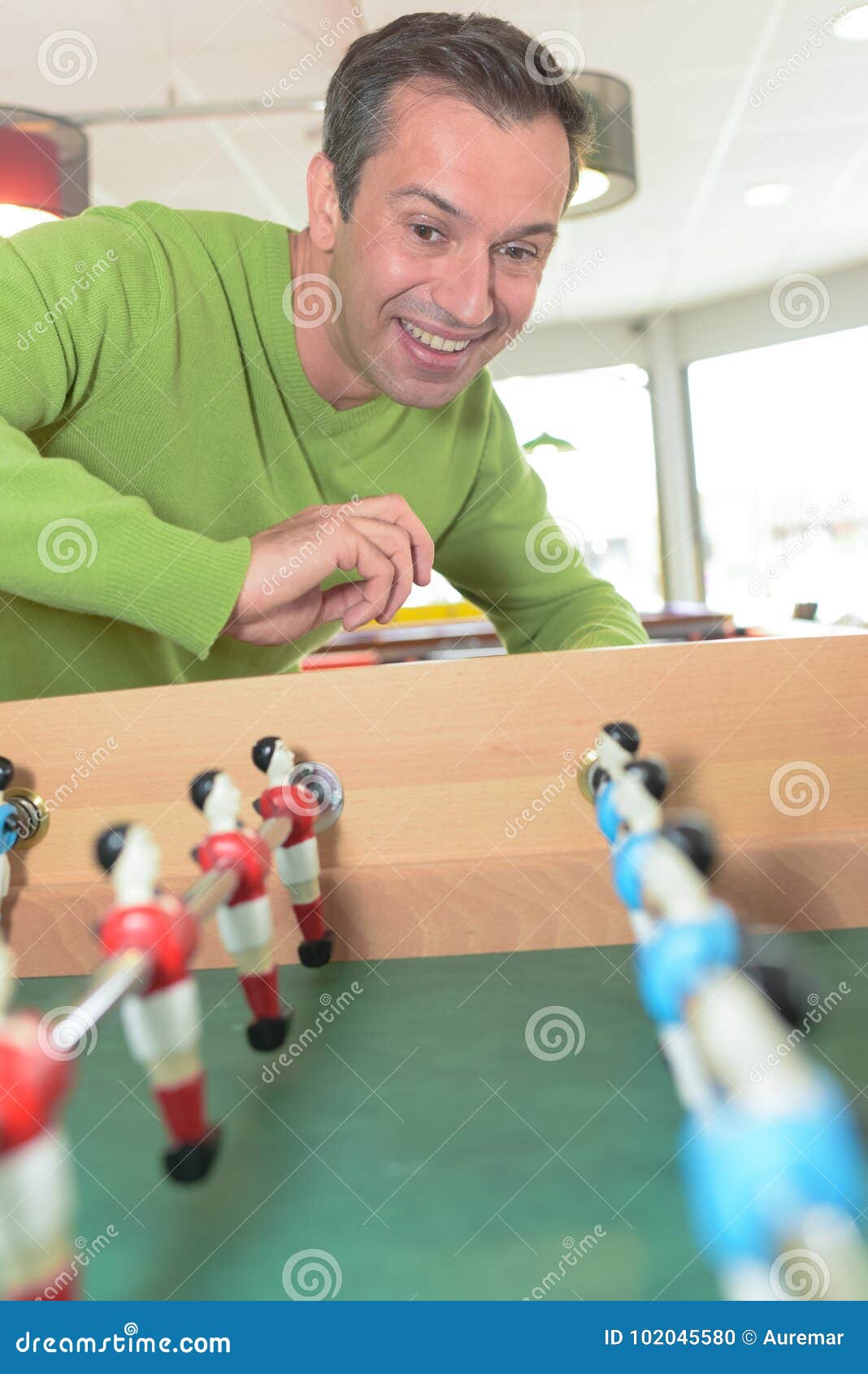 Man Playing on Football Table Stock Photo - Image of symbolics, happy ...