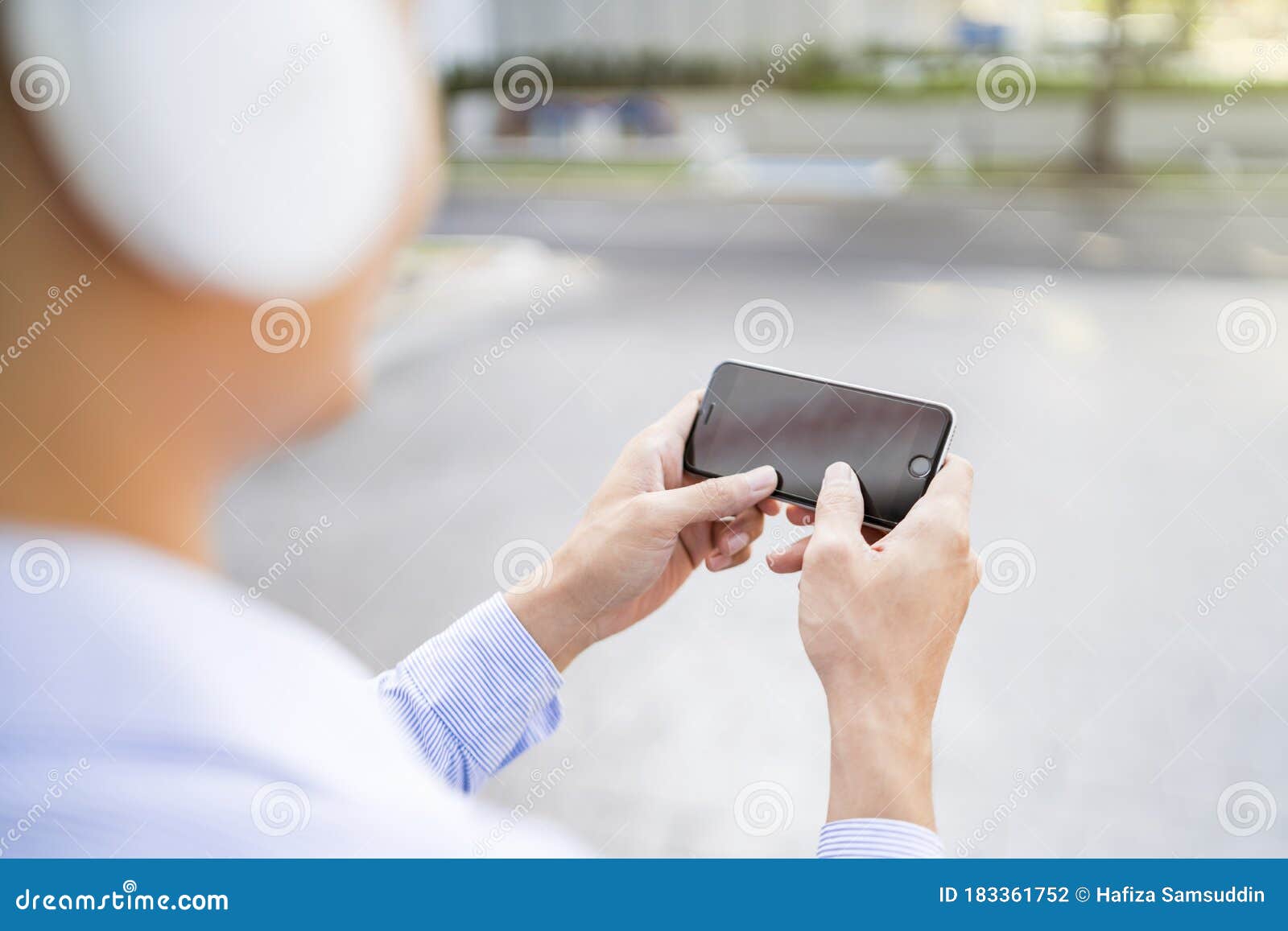 Man Playing Games on His Phone Stock Photo - Image of person, mobile ...